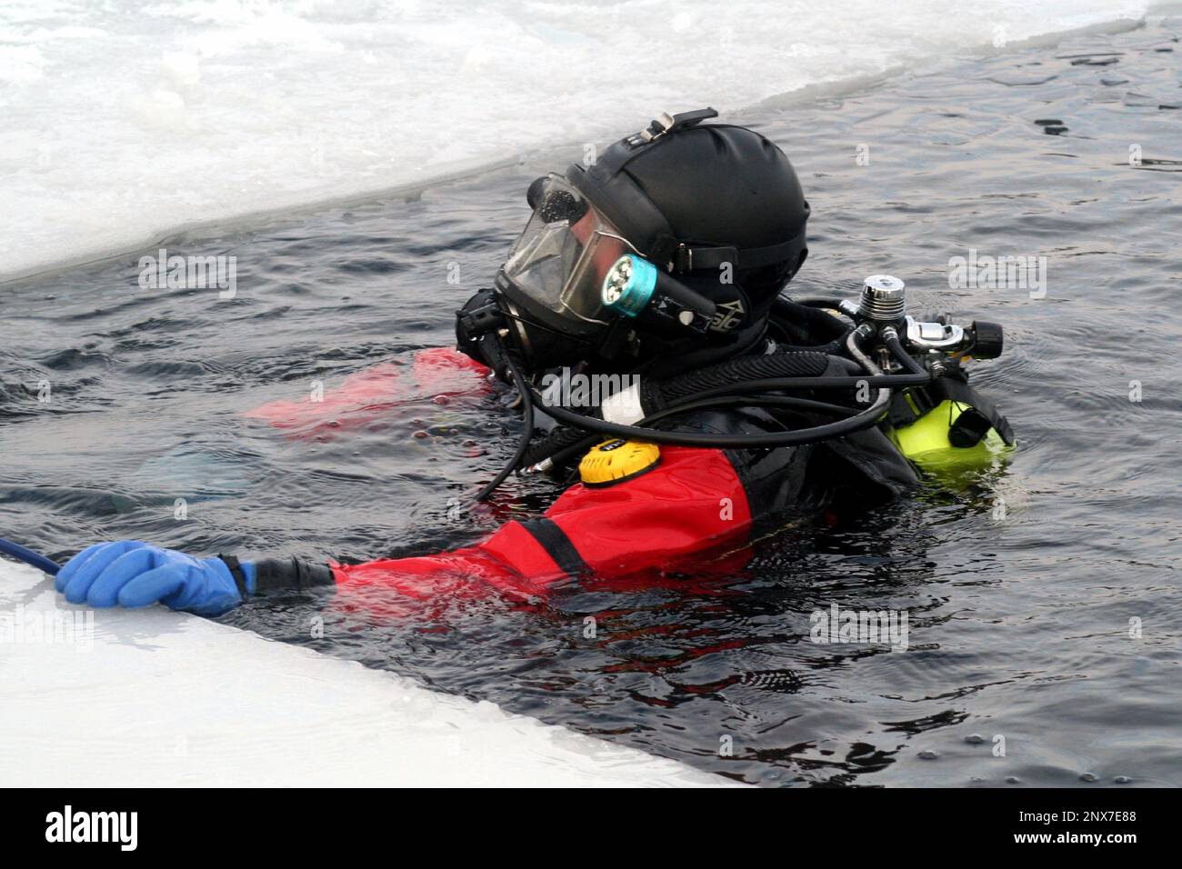 A firefighter with the Directorate of Emergency Services Fire ...
