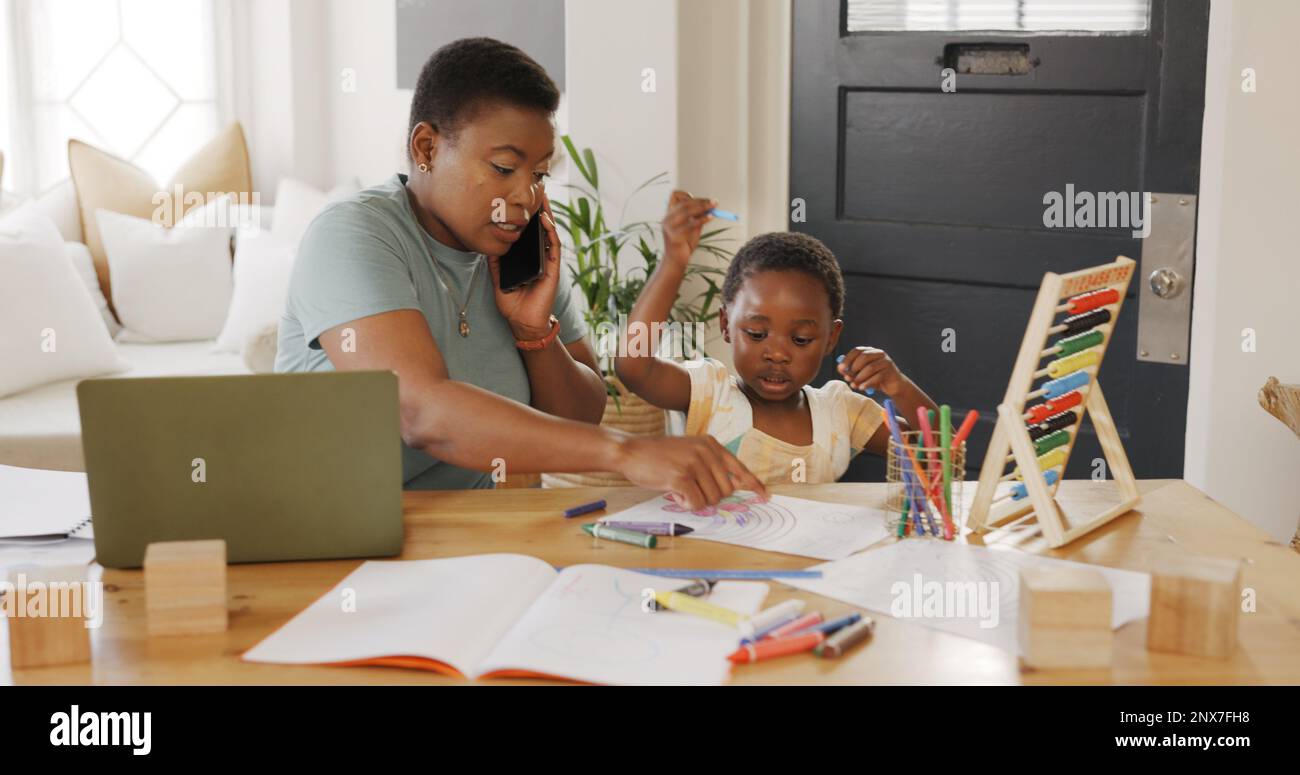 Black woman, laptop and help child with homework, while typing work and ...