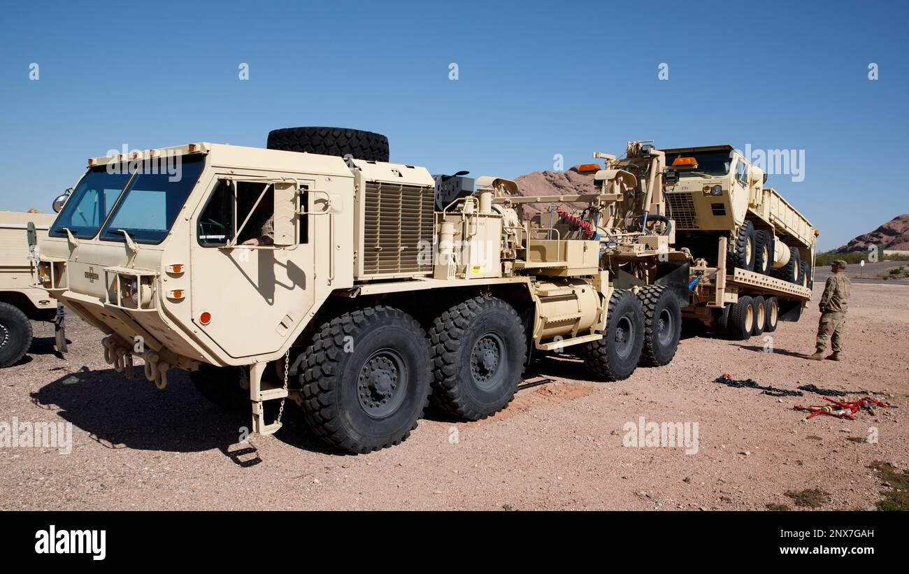 Arizona Army National Guard Sgt. Kevin Fortier provides ground guidance ...