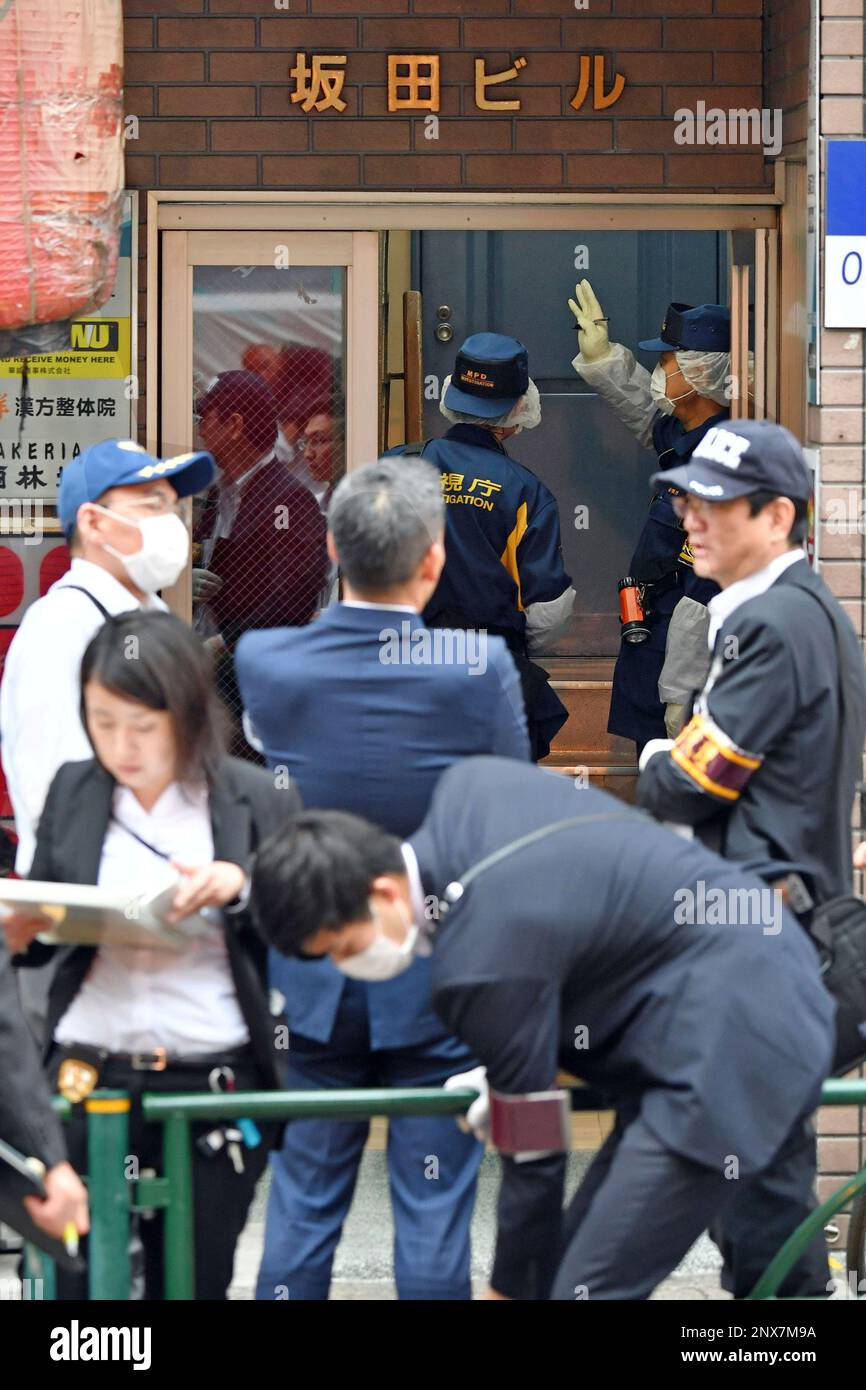 The Metropolitan Police Department officers conduct an investigation a ...