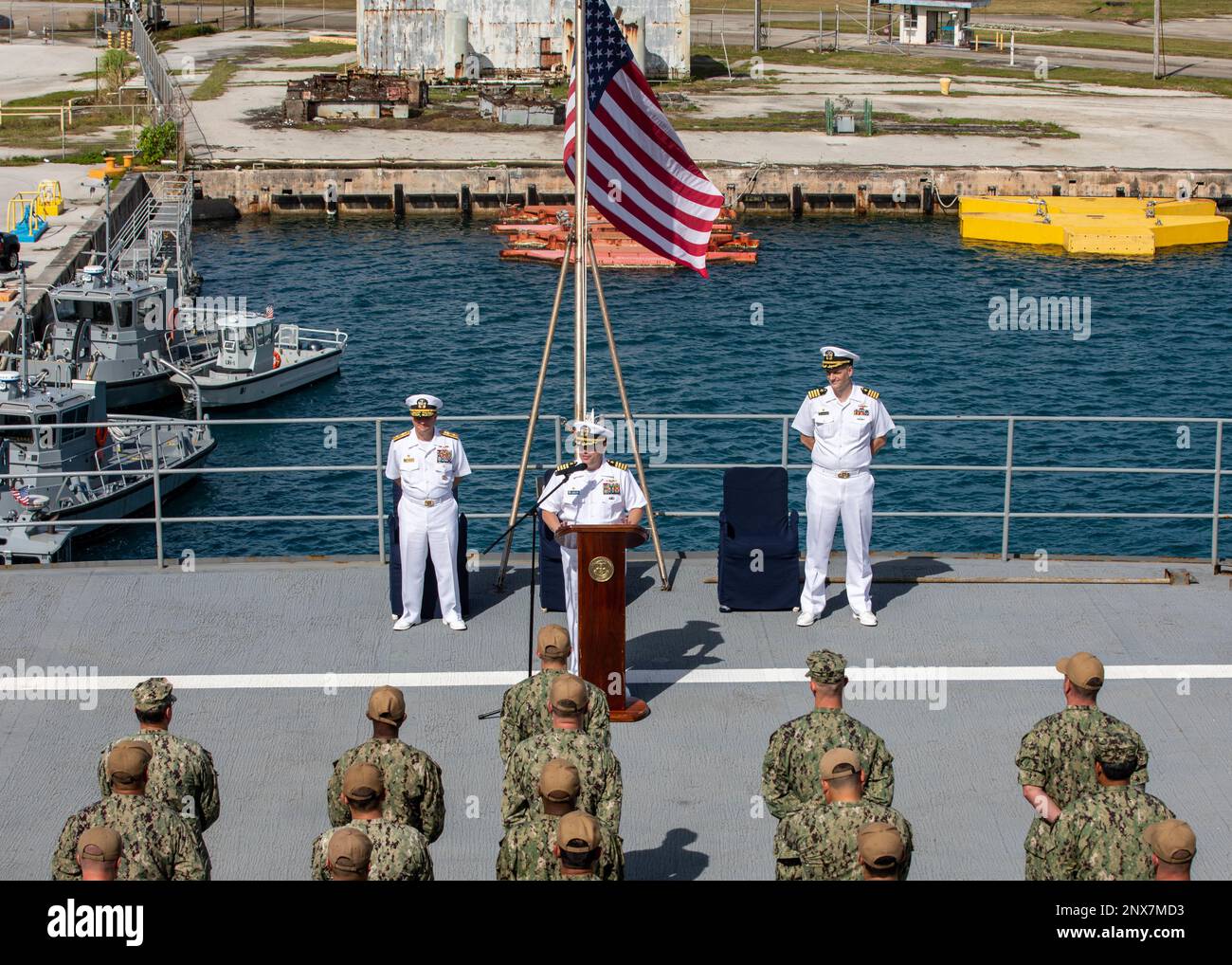 APRA HARBOR, Guam (Feb. 8, 2023) Capt. Andrew Ring, center, commanding ...