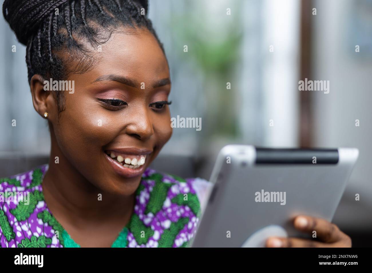 Young African Woman Doing Video Call On Tablet Connects On Social