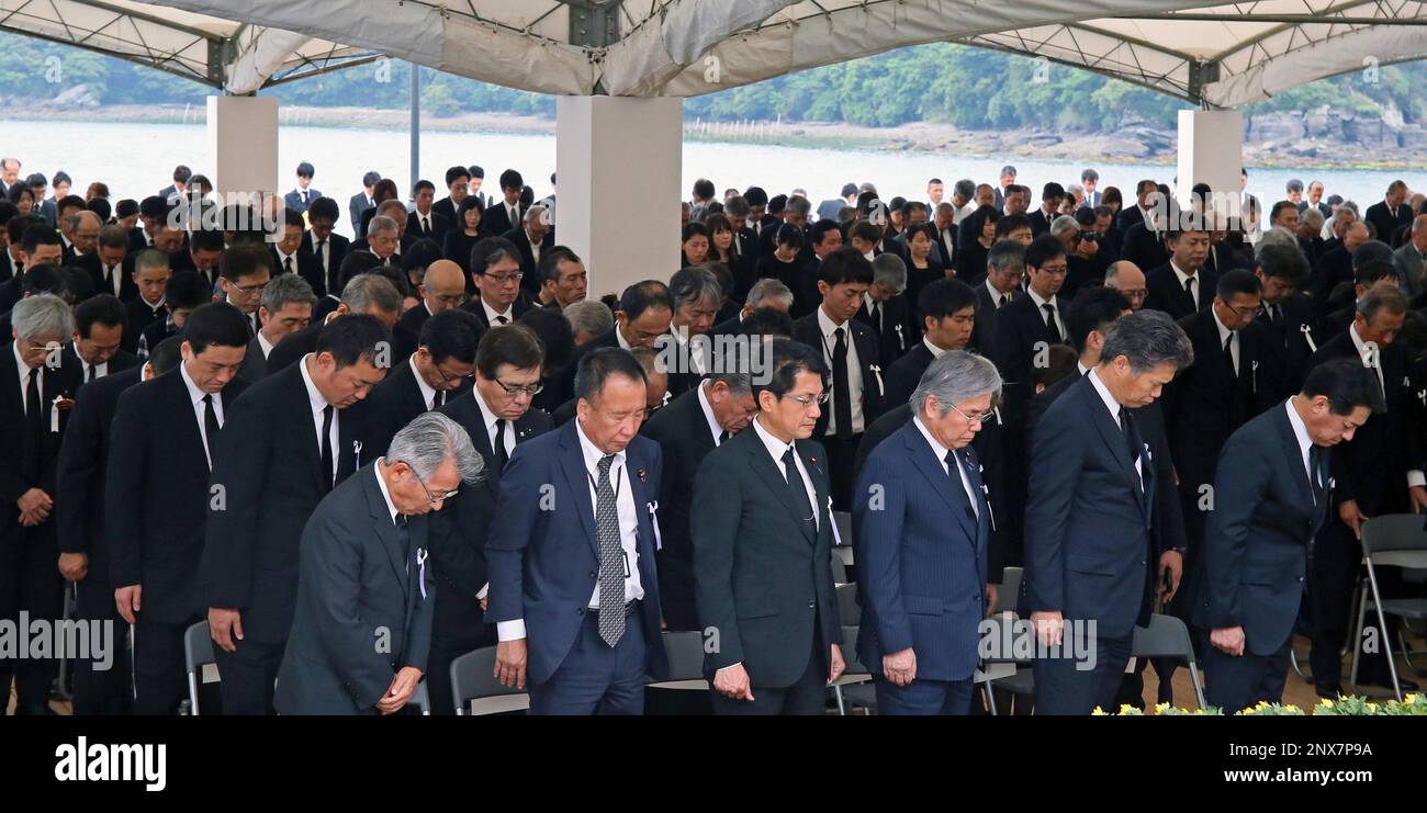 About 700 people including patients offer flowers and pray for the ...