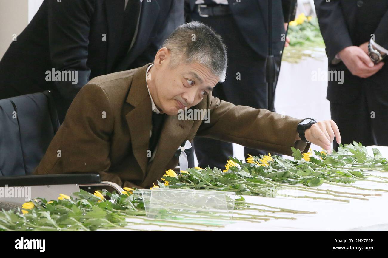 About 700 people including patients offer flowers and pray for the ...