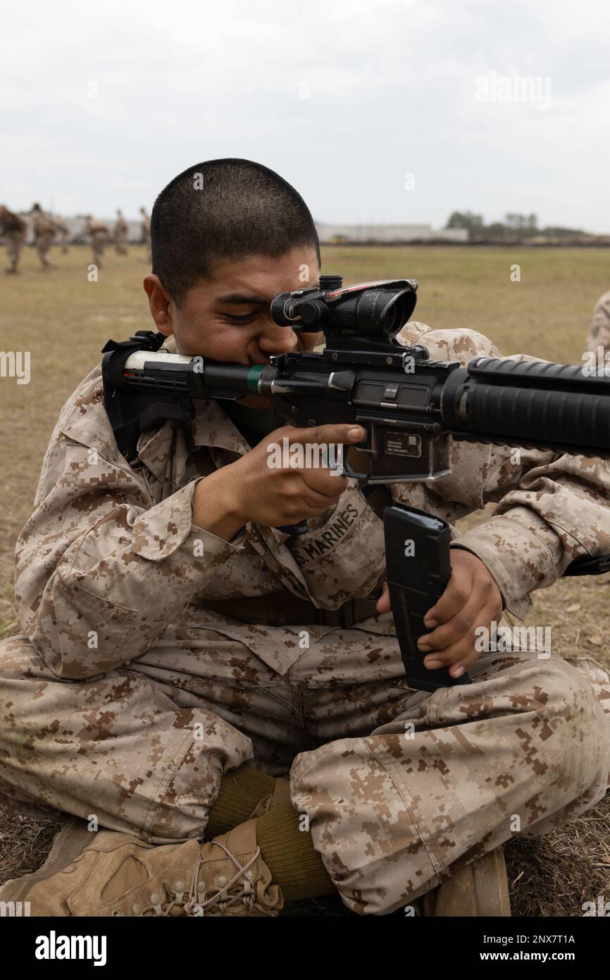 Recruit with Golf Company, 2nd Recruit Training Battalion, changes his ...