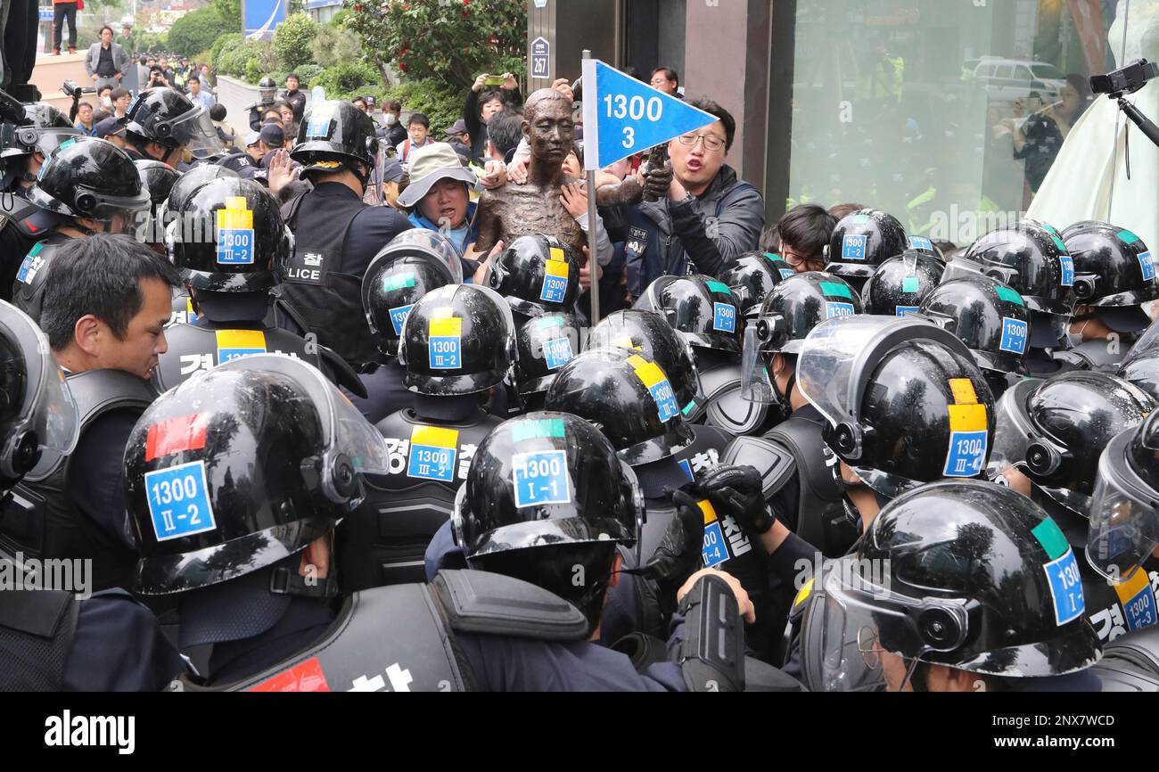 A clash takes place between the riot police official and members of ...