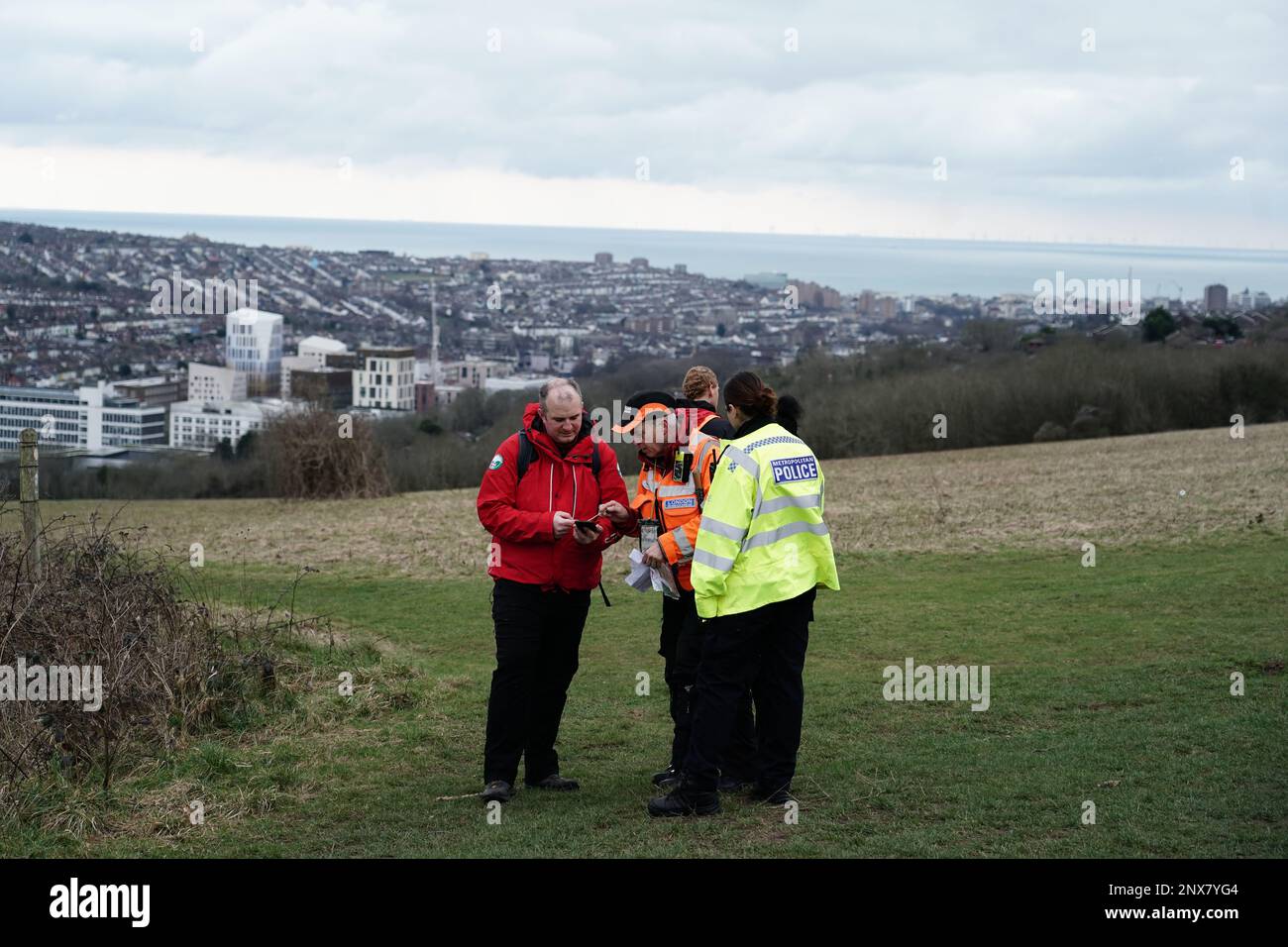 Police officers and officers from London Search and Rescue (LONSAR) at ...
