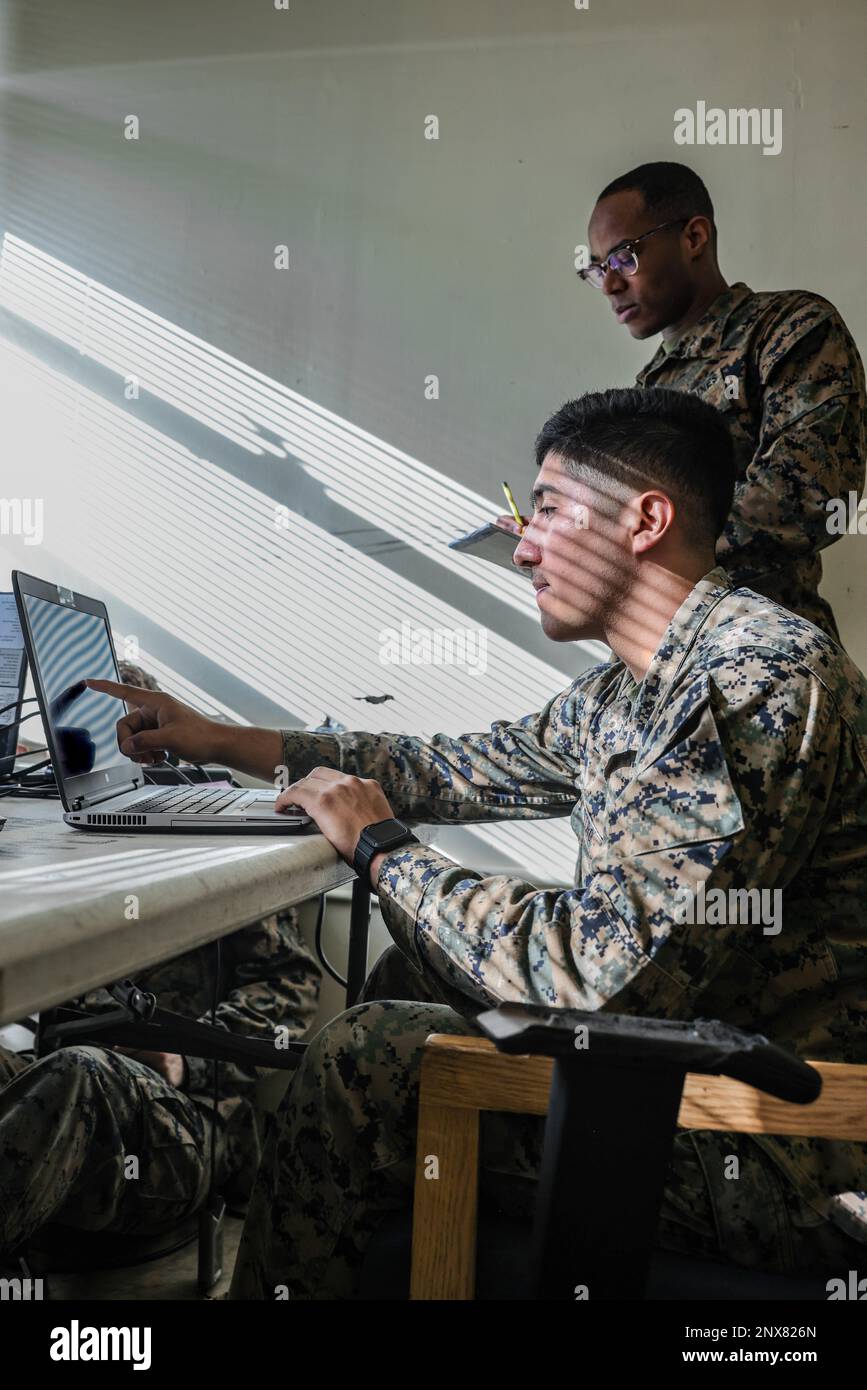 U.S. Marine Corps Cpl. Trai Baskin, a refrigeration and A/C technician ...