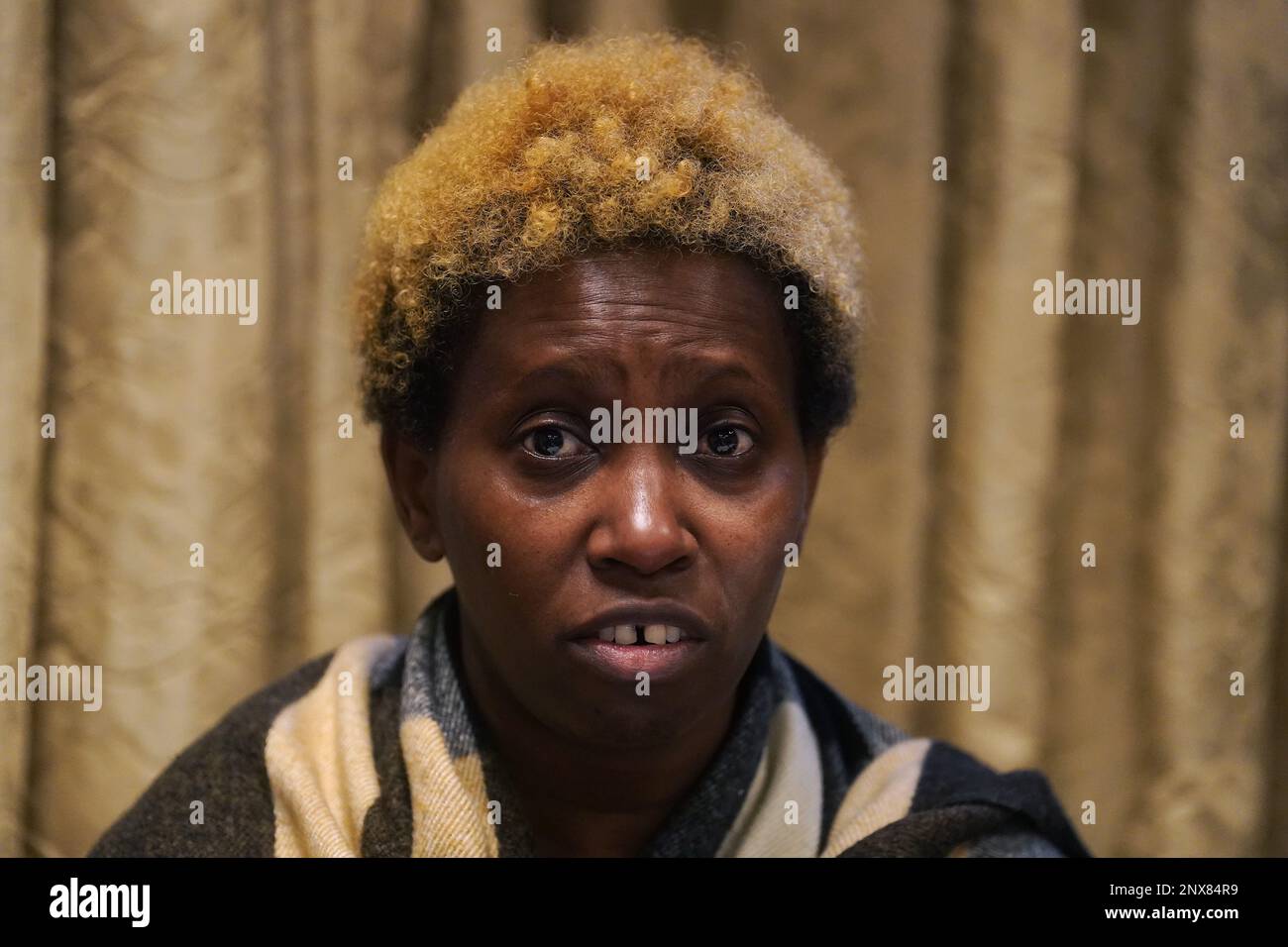 Anne Waithira-Burke of AkiDwA speaking at the launch of a march planned ...