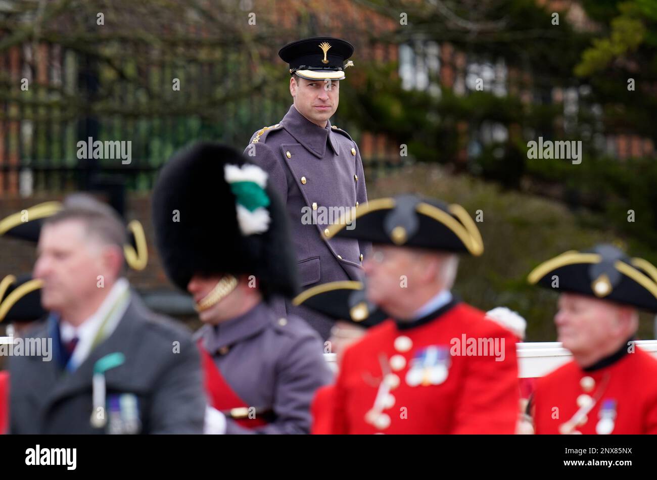 The Prince of Wales, Colonel of the Welsh Guards, watches a march past ...