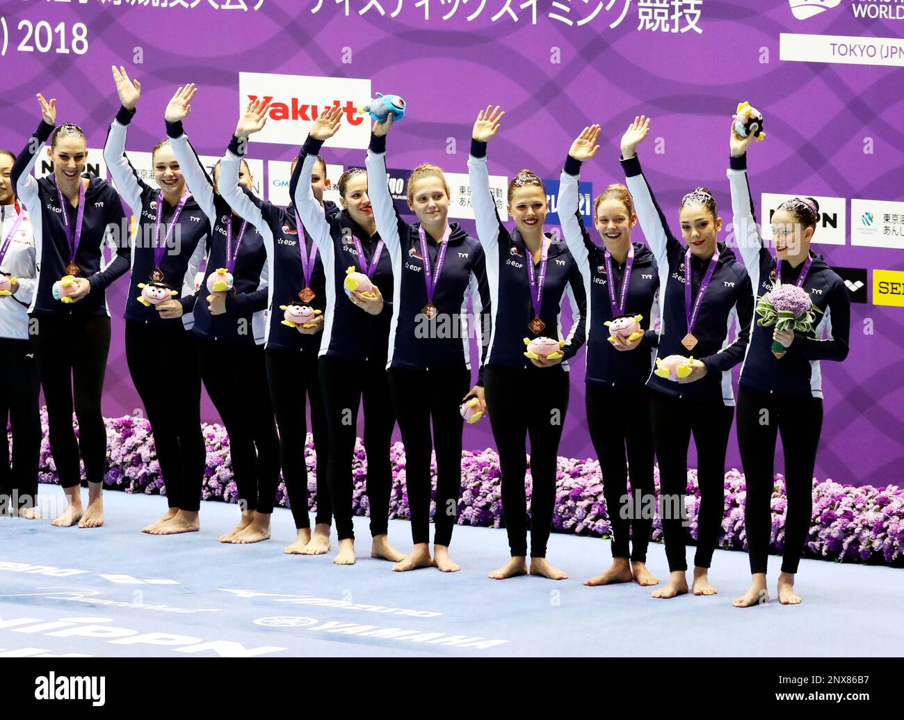 French swimmers celebrate after placing 3rd in the team technical of ...