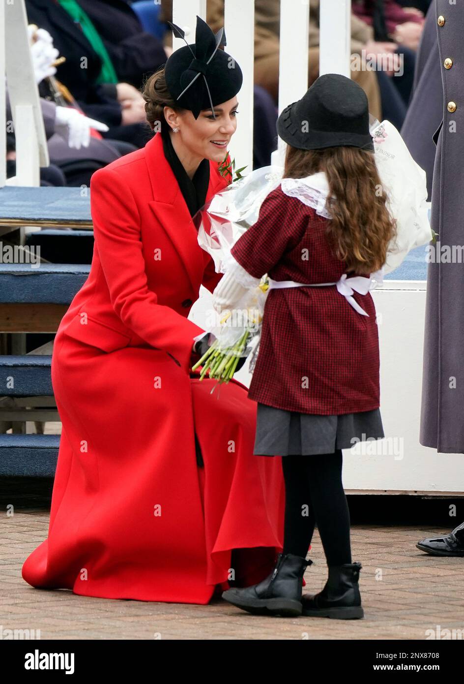 The Princess of Wales (left) receives a bunch of flowers during a St ...