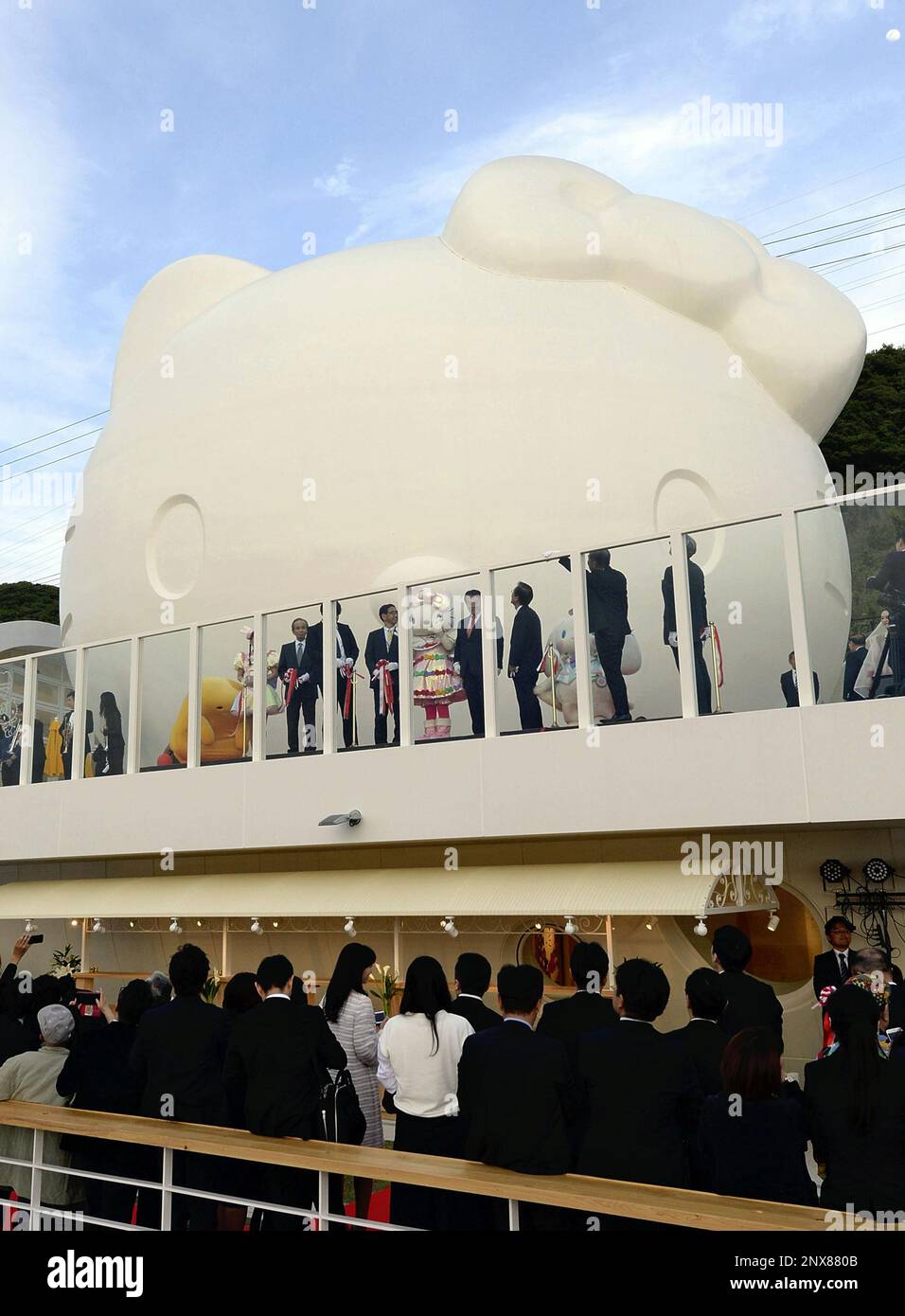 Hello Kitty mascot (C) attends an opening ceremony of “Hello Kitty ...