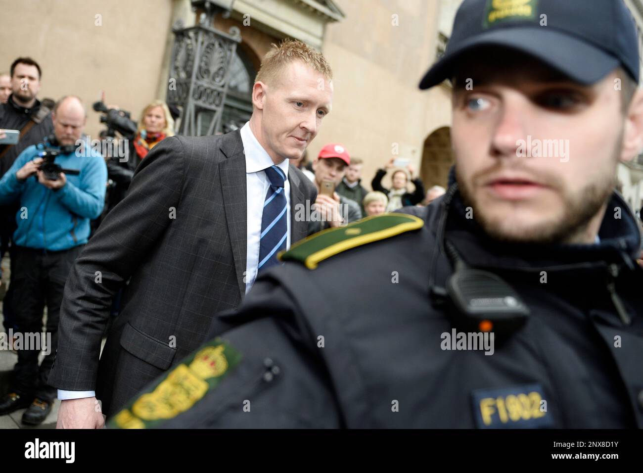 Prosecutor Jakob Buch-Jepsen, left, leaves after a press briefing in ...