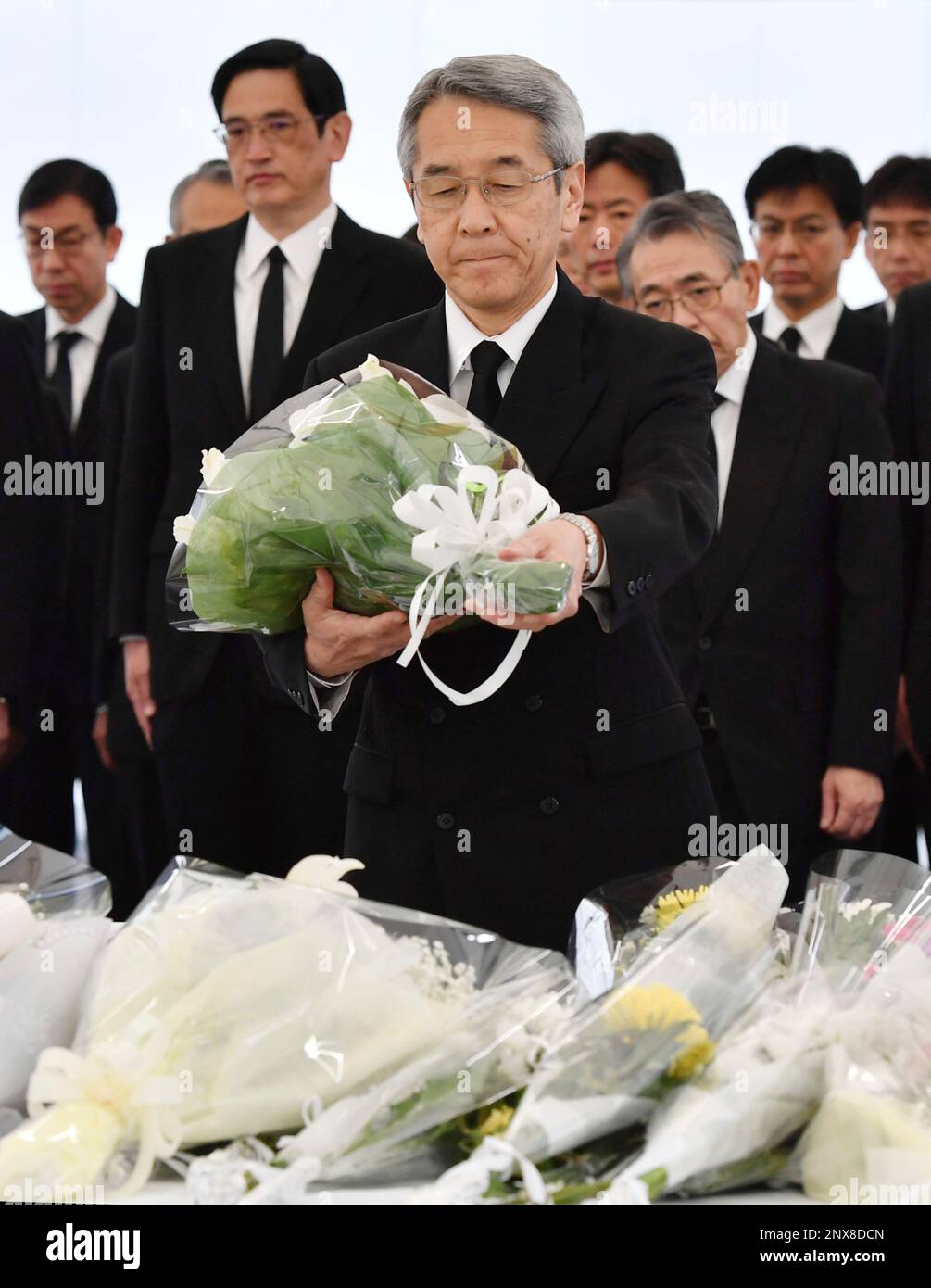The West Japan Railway Co. President Tatsuo Kijima mourns the victims of the JR Fukuchiyama Line ...