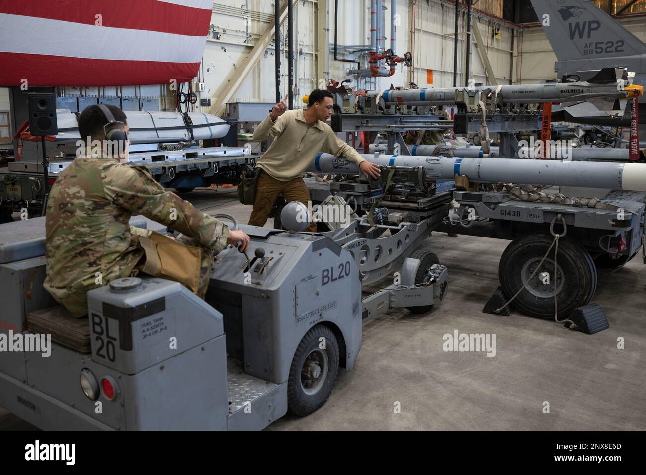 Airman Julio Valle (left), 80th Fighter Generation Squadron load crew ...