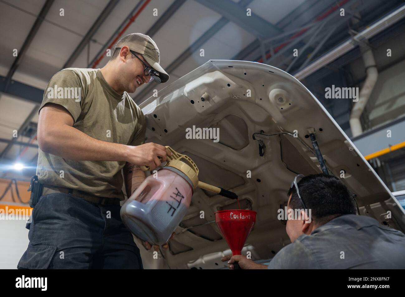 Senior Airman Michael Harvey, vehicle mechanic, left, and Senior Airman ...