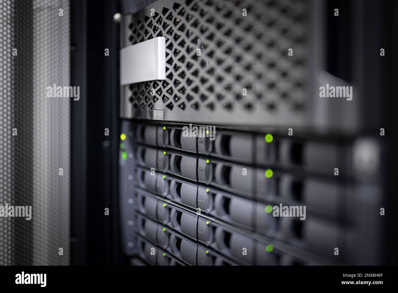 oblique perspective on a network storage device with many hard drives ...