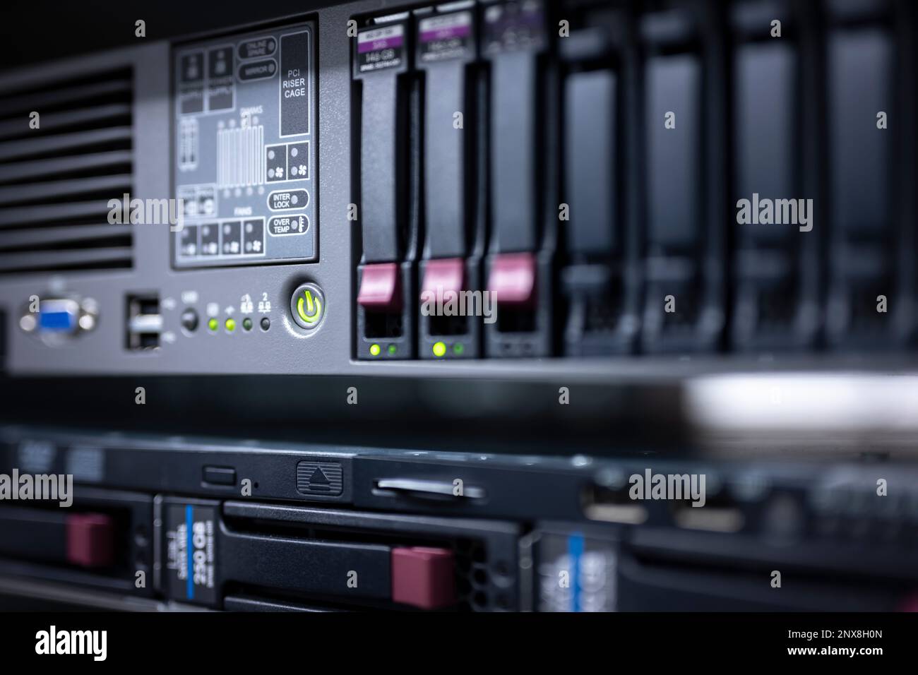 rack-mounted server with hard disk slots, green LED illuminated buttons ... rack-mounted server with hard disk slots, green LED illuminated buttons ...