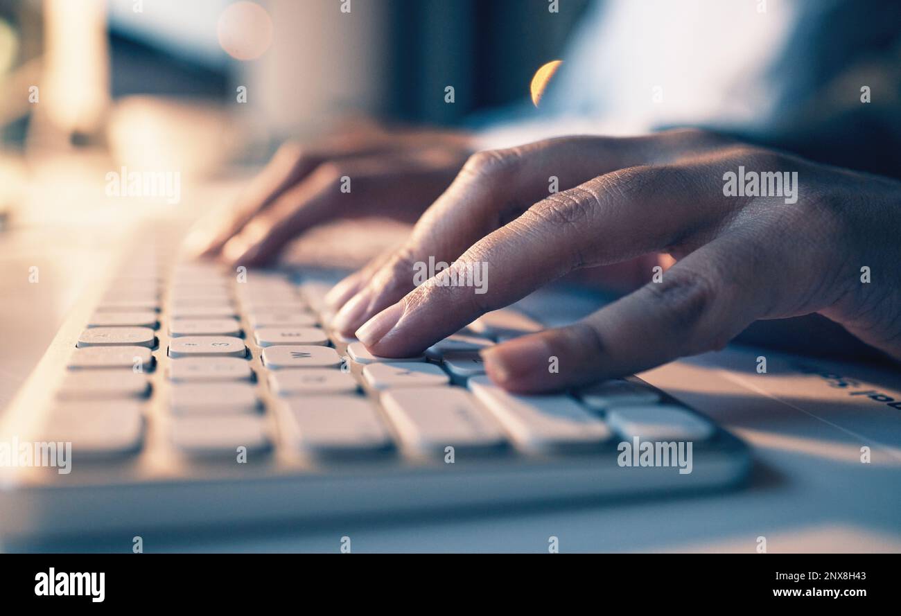 Typing, computer and night with hands of person in office for email ...