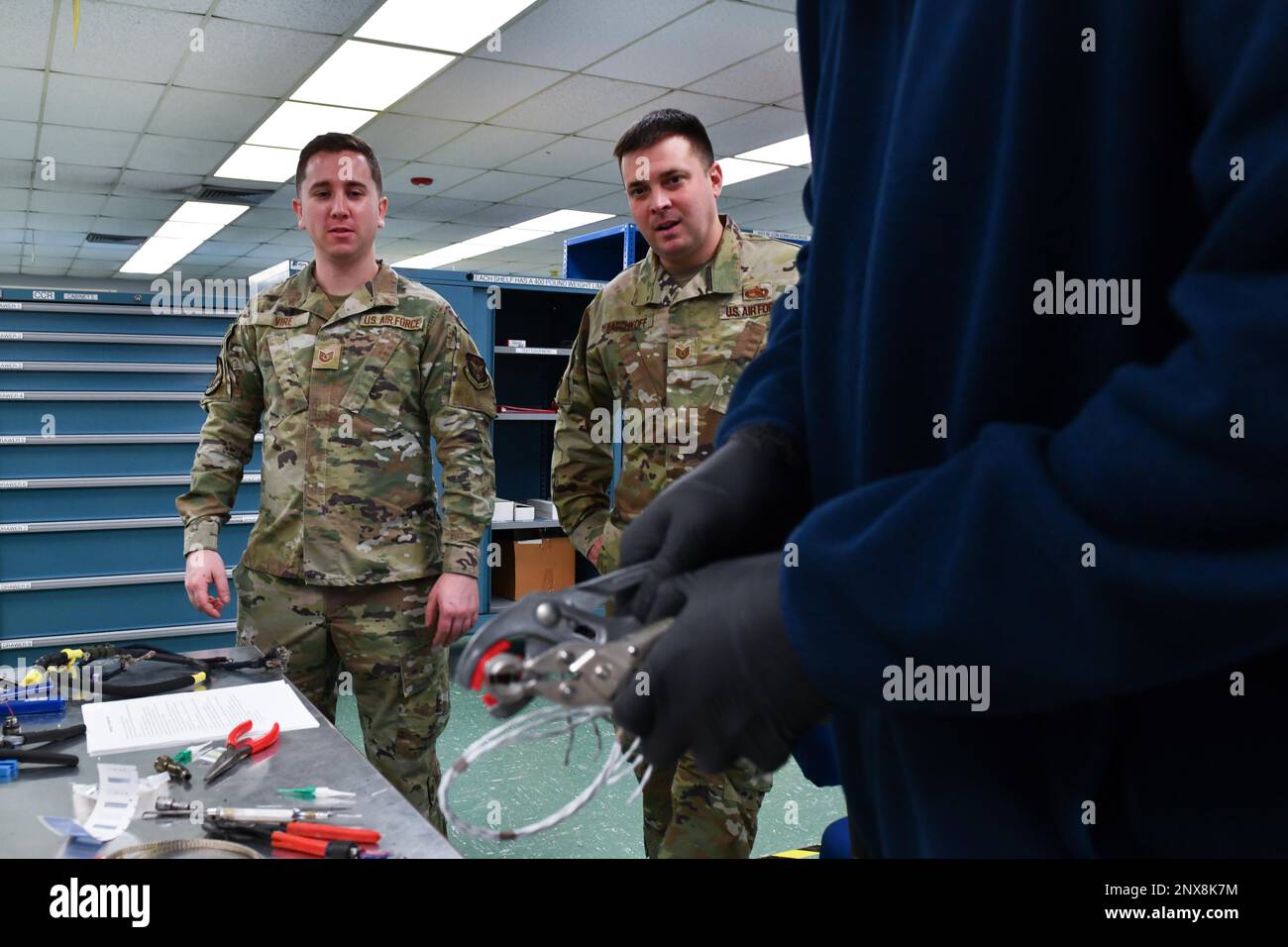 From right, Kevin Ware, 97th Maintenance Squadron (MXS) electrical and ...