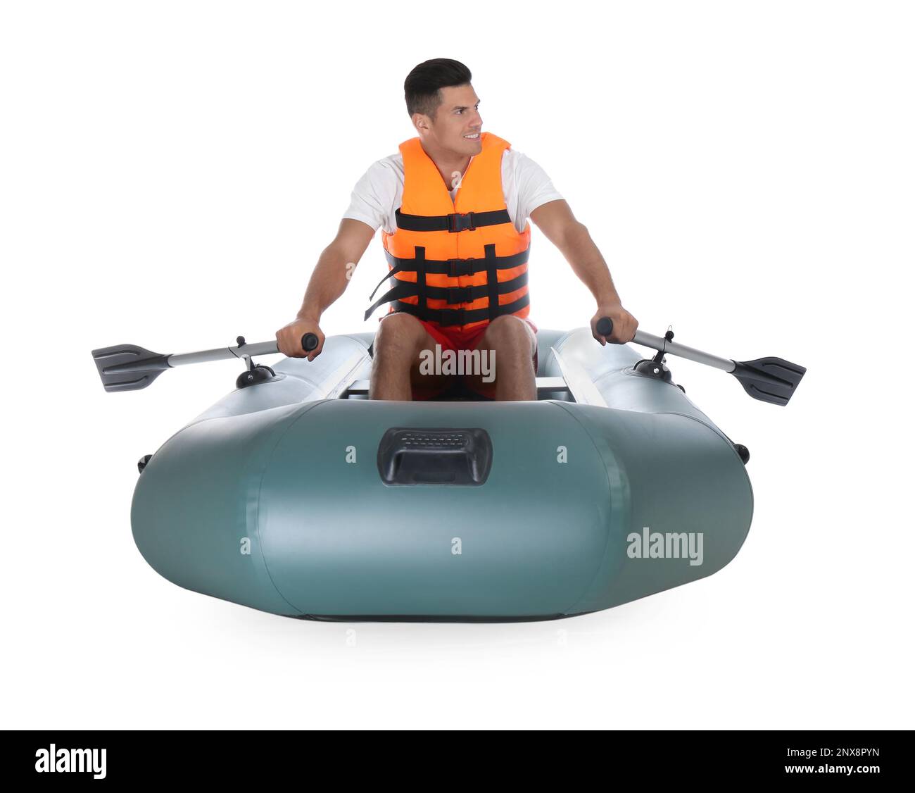 Man in life vest rowing inflatable rubber boat on white background ...