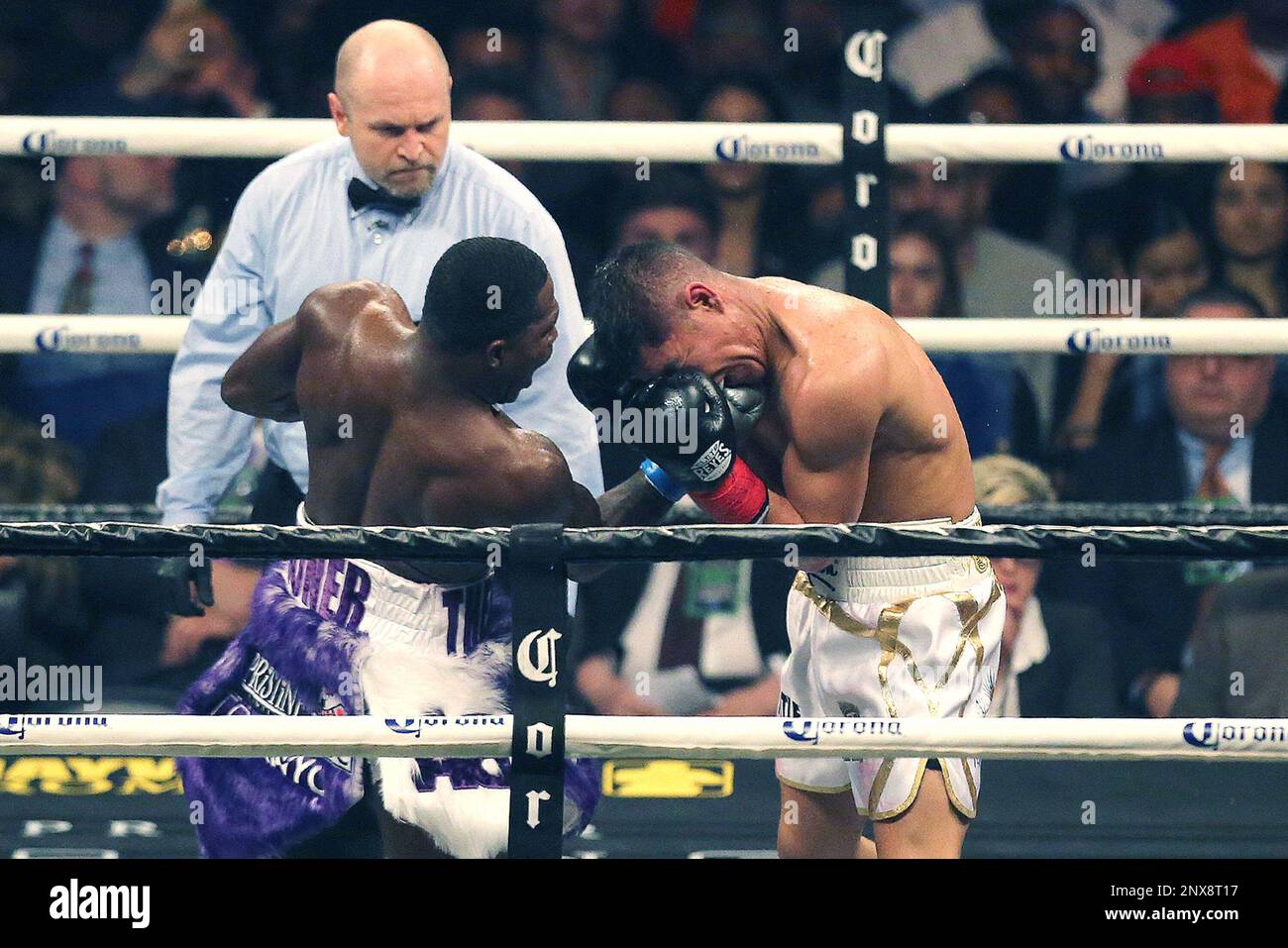 Adrien Broner (L) punches Jessie Vargas in the face during a Showtime ...