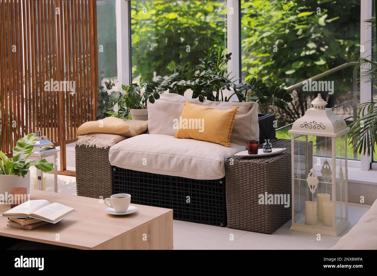 Indoor terrace interior with modern furniture and houseplants Stock ...