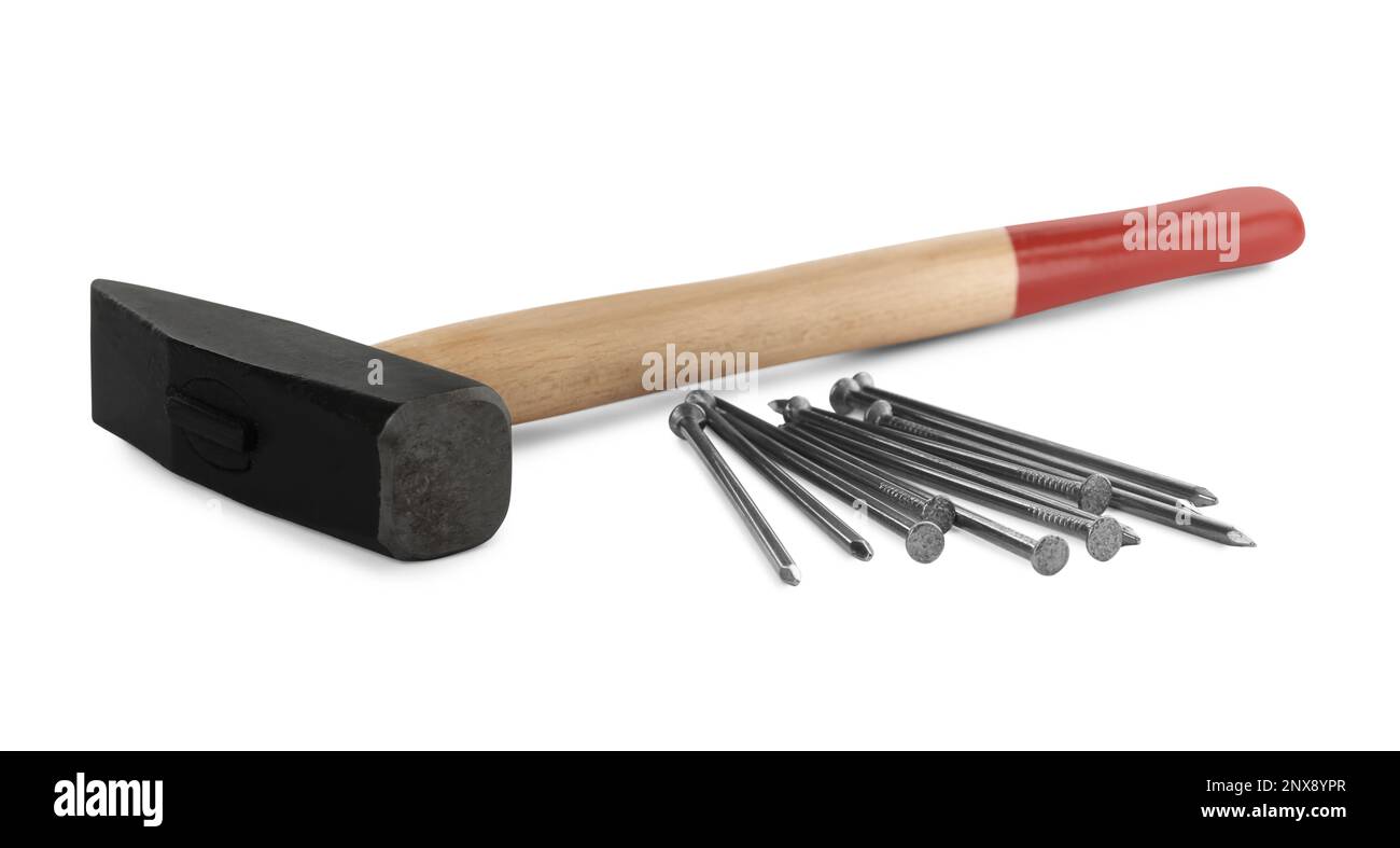 Hammer and metal nails on white background Stock Photo - Alamy