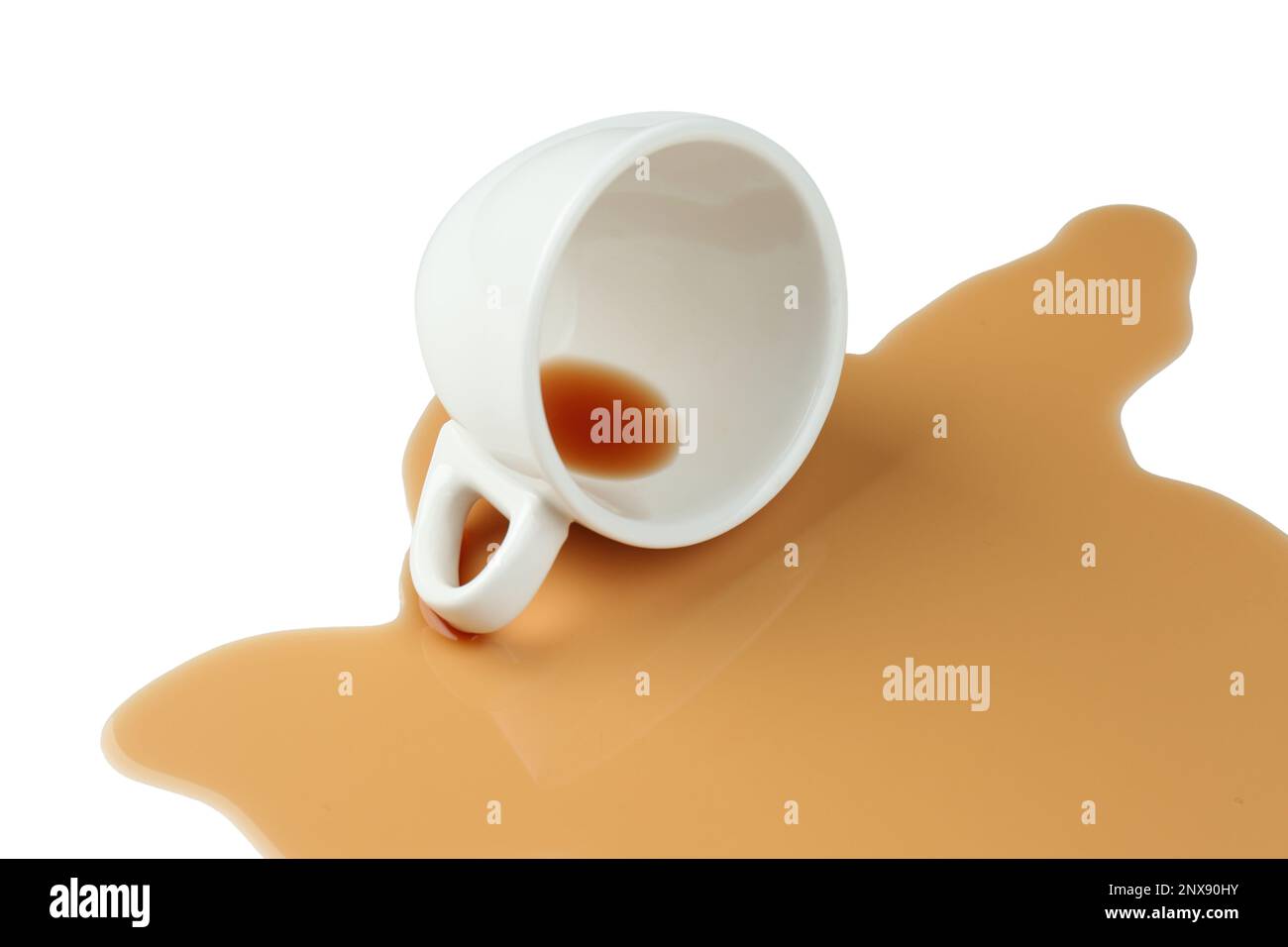 Overturned cup and spilled coffee on white background Stock Photo - Alamy