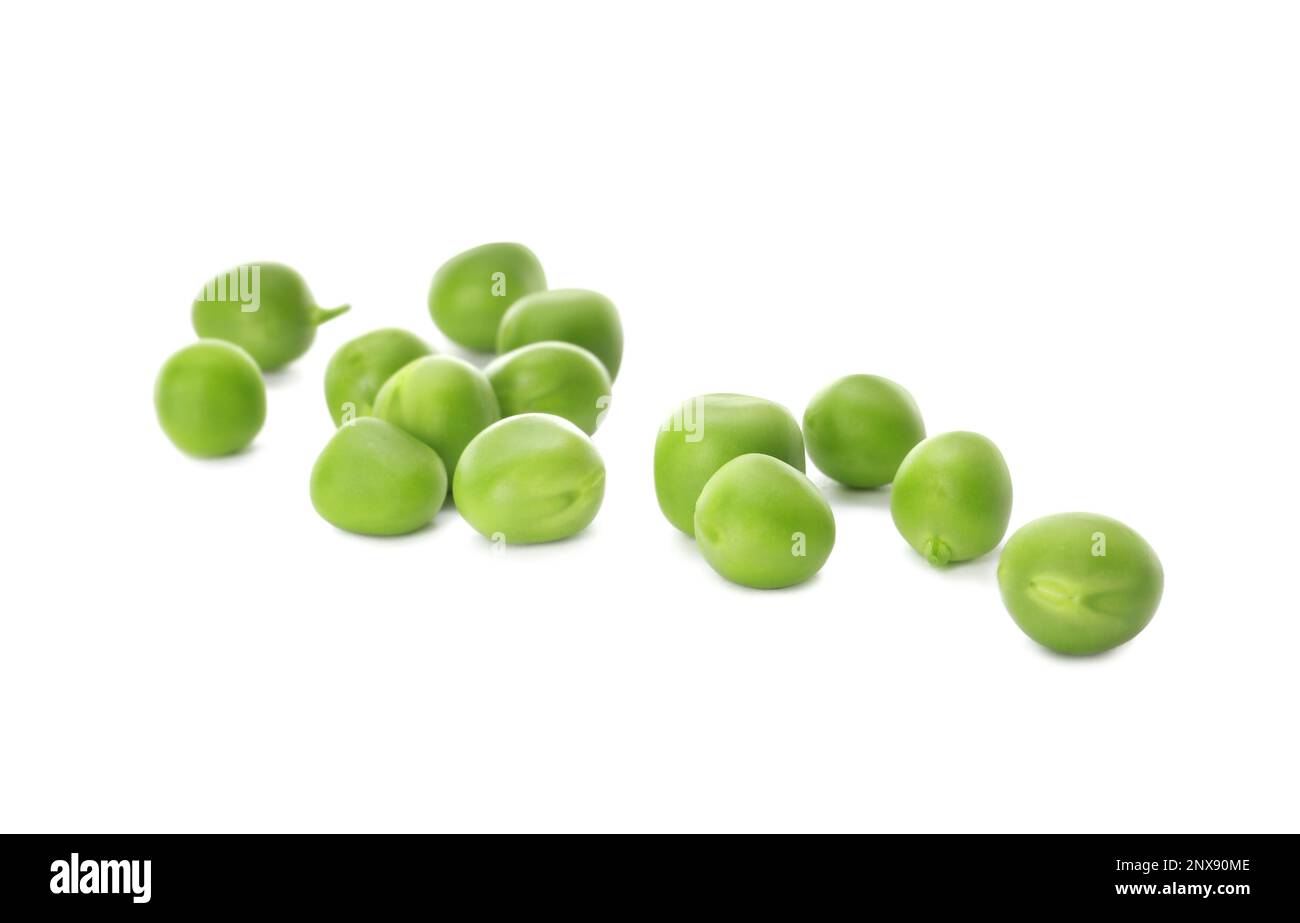 Fresh raw green peas on white background Stock Photo - Alamy