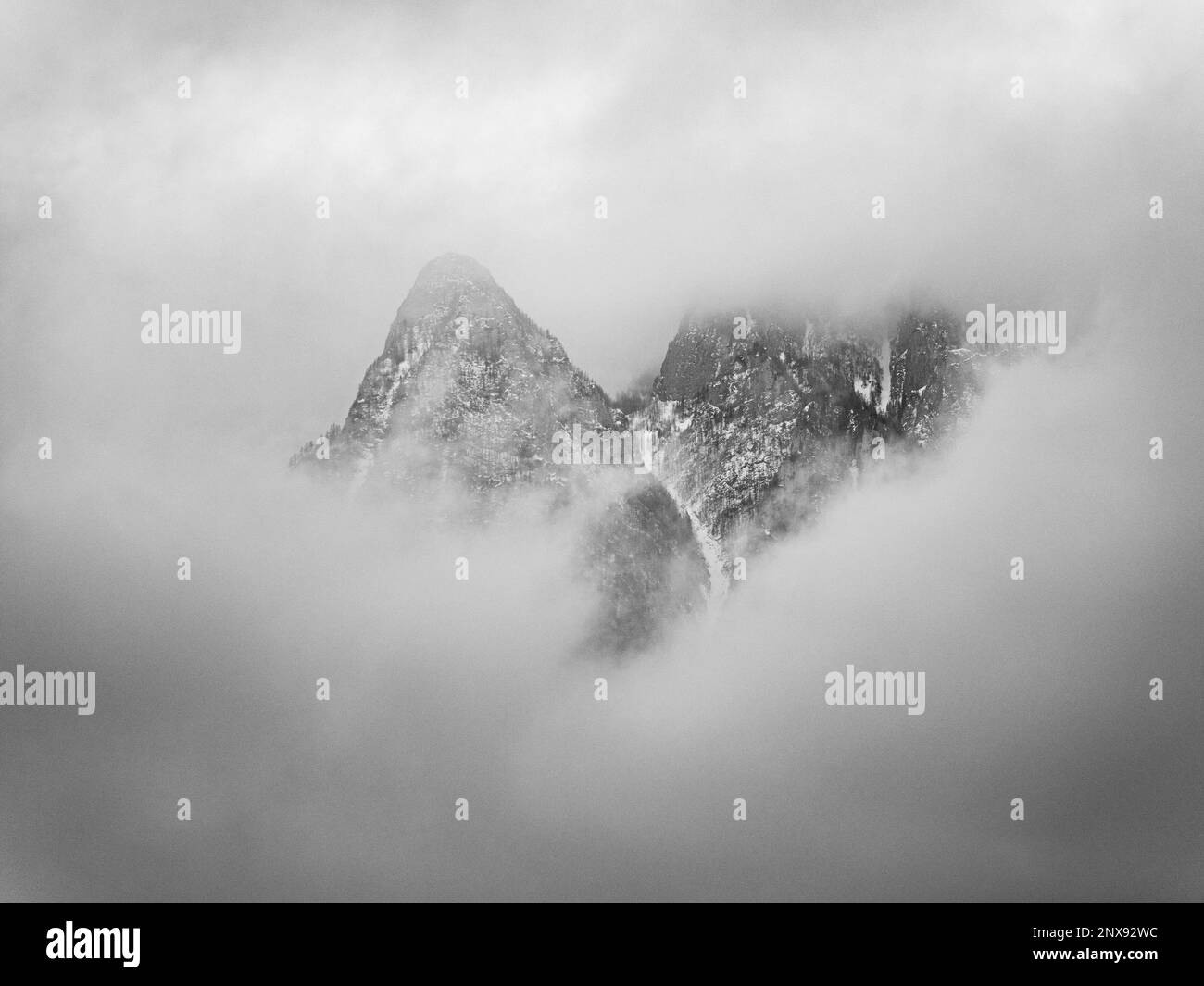 cloud window with a view over bucegi peaks, romania, near busteni city ...