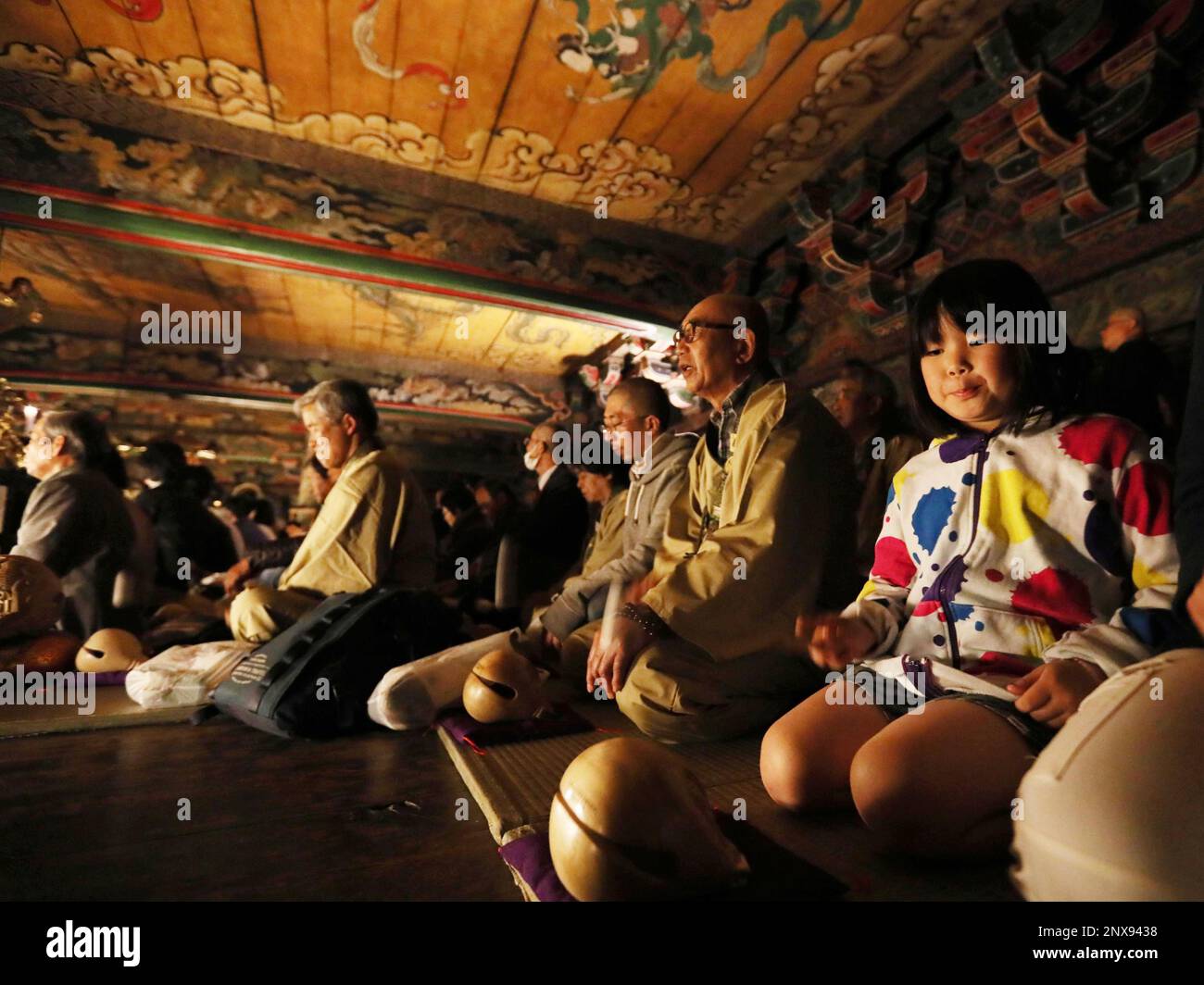 Worshippers chant the nembutsu, Buddhist invocation, all night while ...