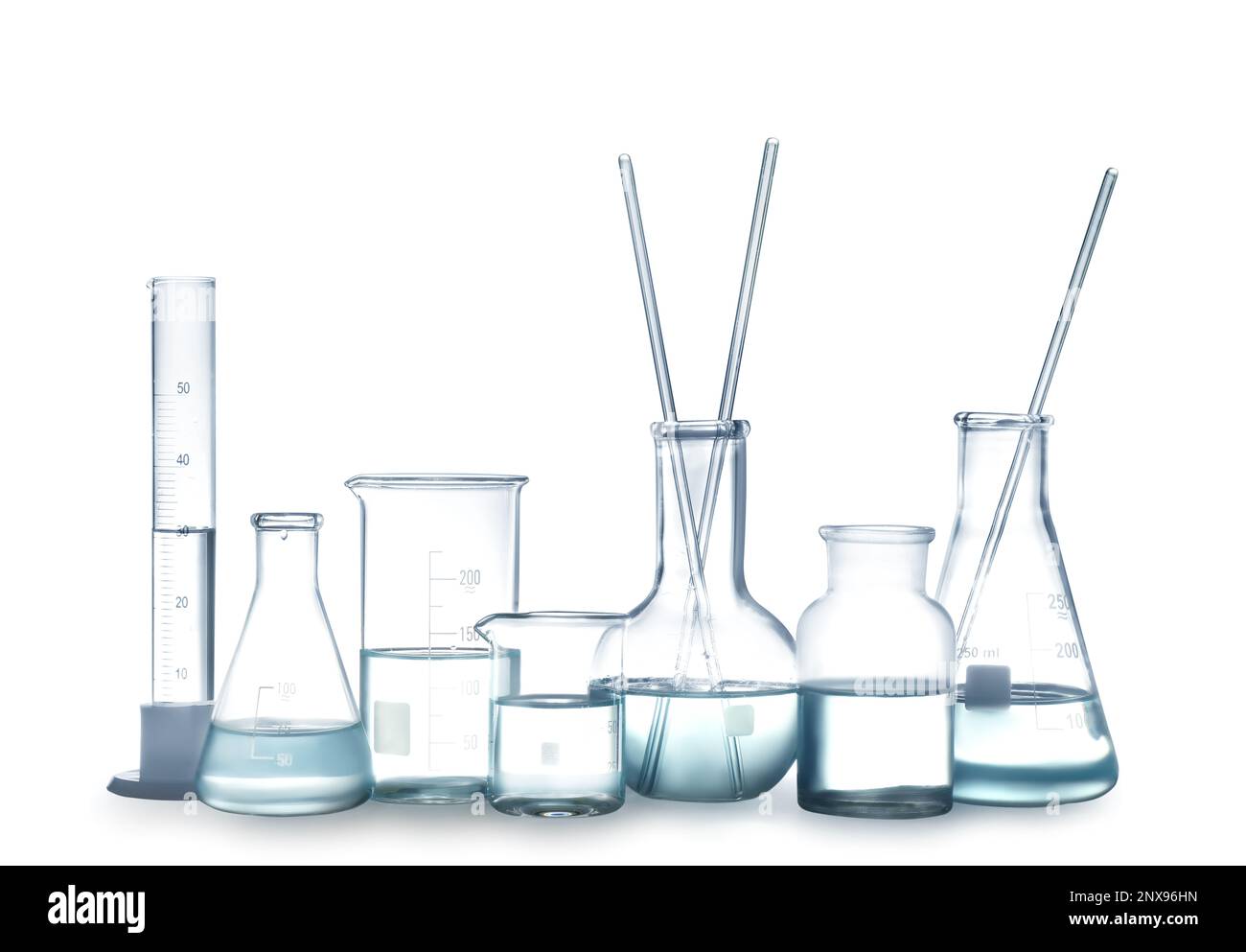Laboratory glassware with liquid isolated on white Stock Photo - Alamy