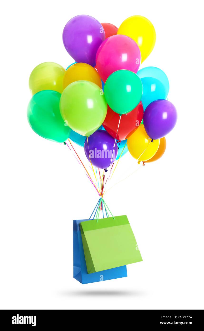 Bunch of color balloons and paper bags on white background Stock Photo ...