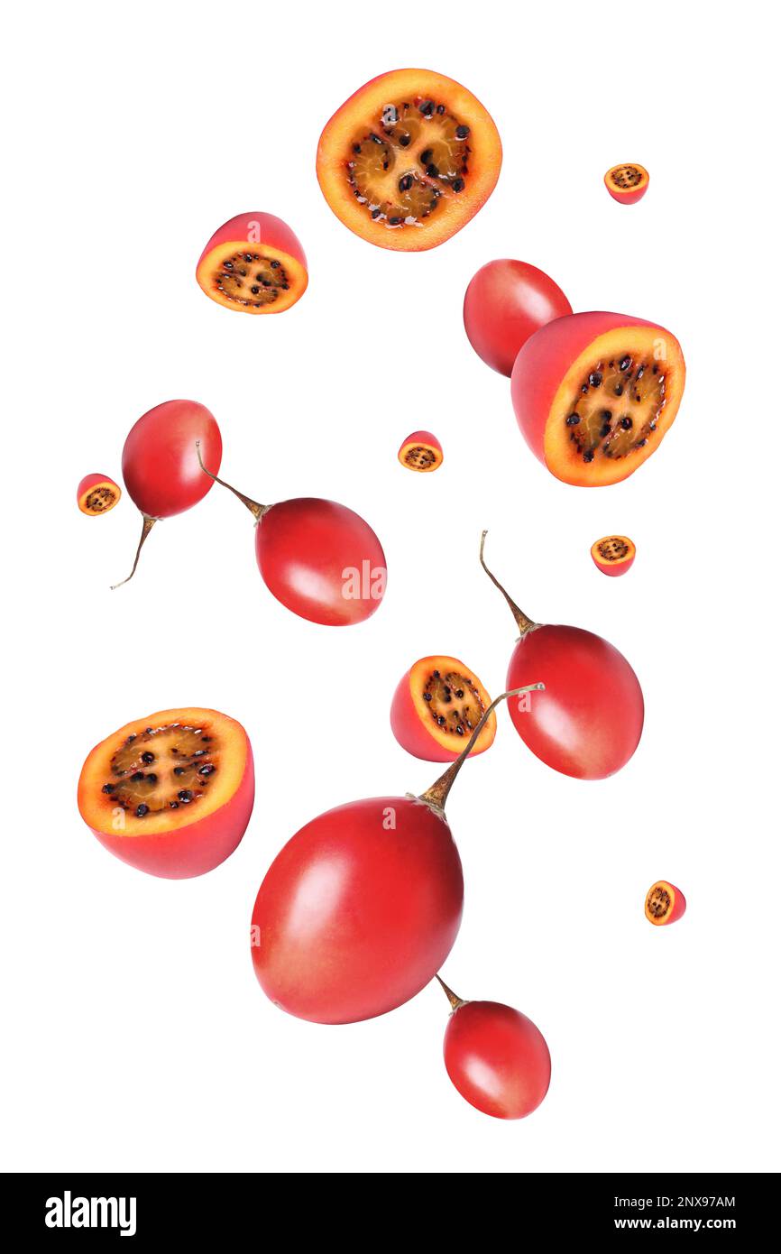 Delicious exotic tamarillo fruits flying on white background Stock ...