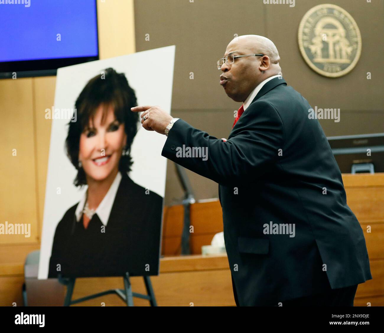 Chief Assistant District Attorney Clint Rucker, with a photo of Diane ...
