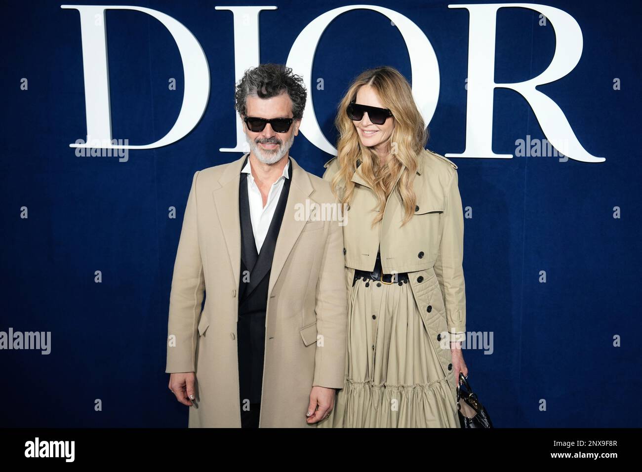 Elle Macpherson and Doyle Bramhall pose before the Christian Dior Fall ...