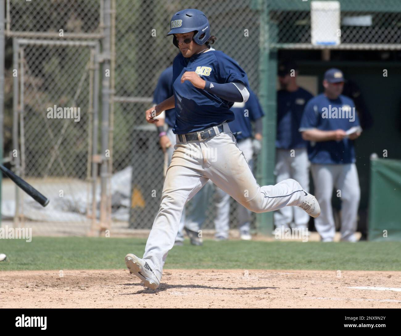 Cal State Monterey Bay Otters third baseman Ruben Gonzalez (4) crosses ...