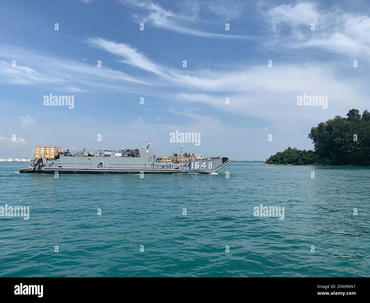 230112-N-YQ414-124 PULAU SUDONG (Jan. 12, 2023) Landing Craft, Utility ...