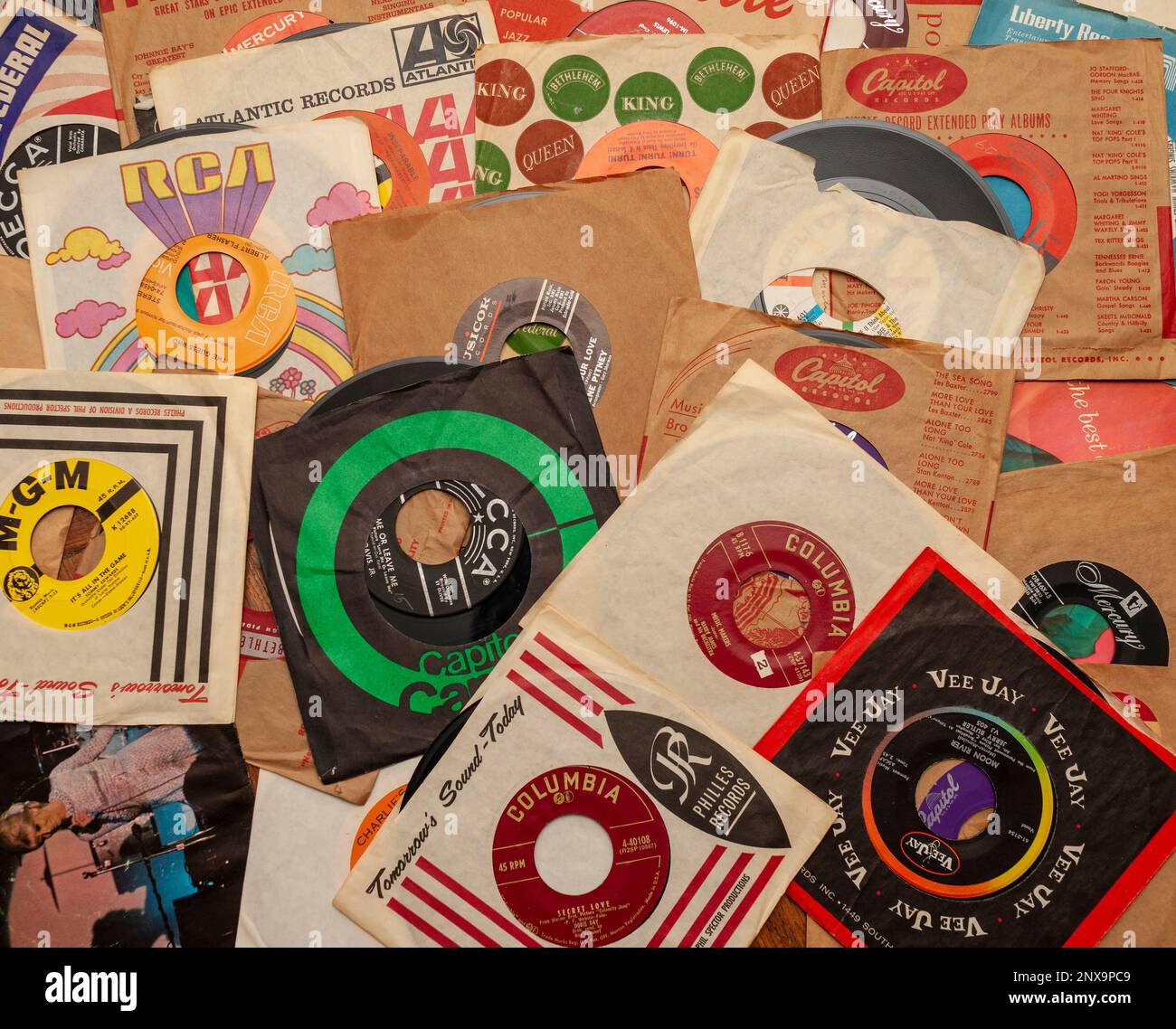 A selection of vinyl 45rpm single records.from various recording ...