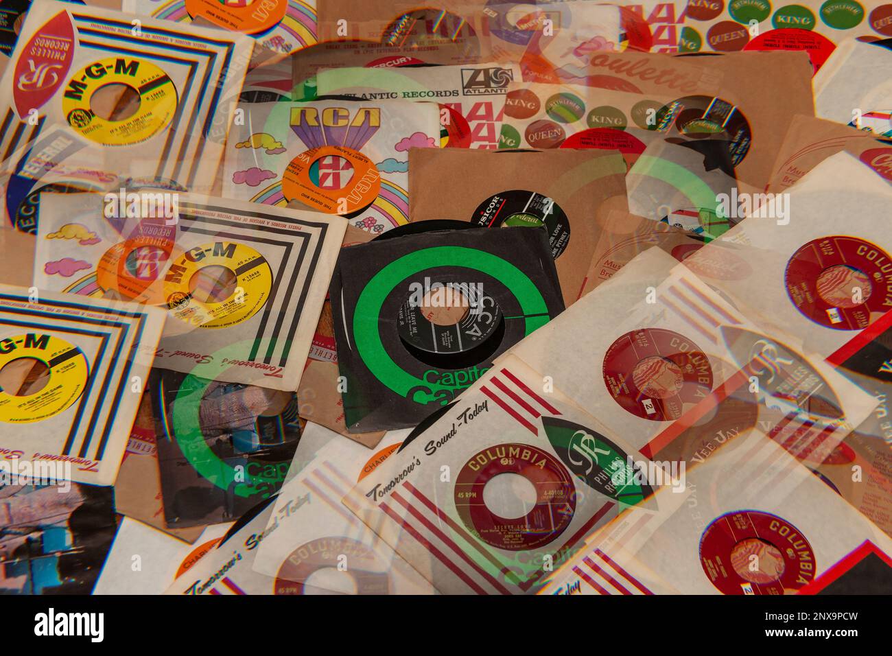 A selection of vinyl 45rpm single records.from various recording ...