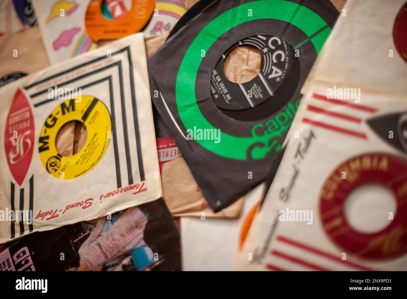 A selection of vinyl 45rpm single records.from various recording ...