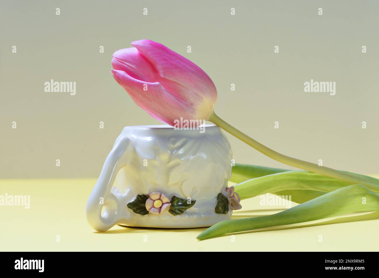 Decorative motif based on the inverted position of a tea cup with a ...