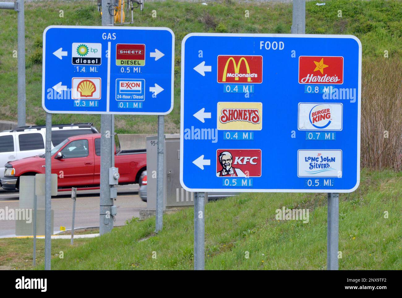 Interstate signs for food and gas are seen at Exit 5 in Bristol ...