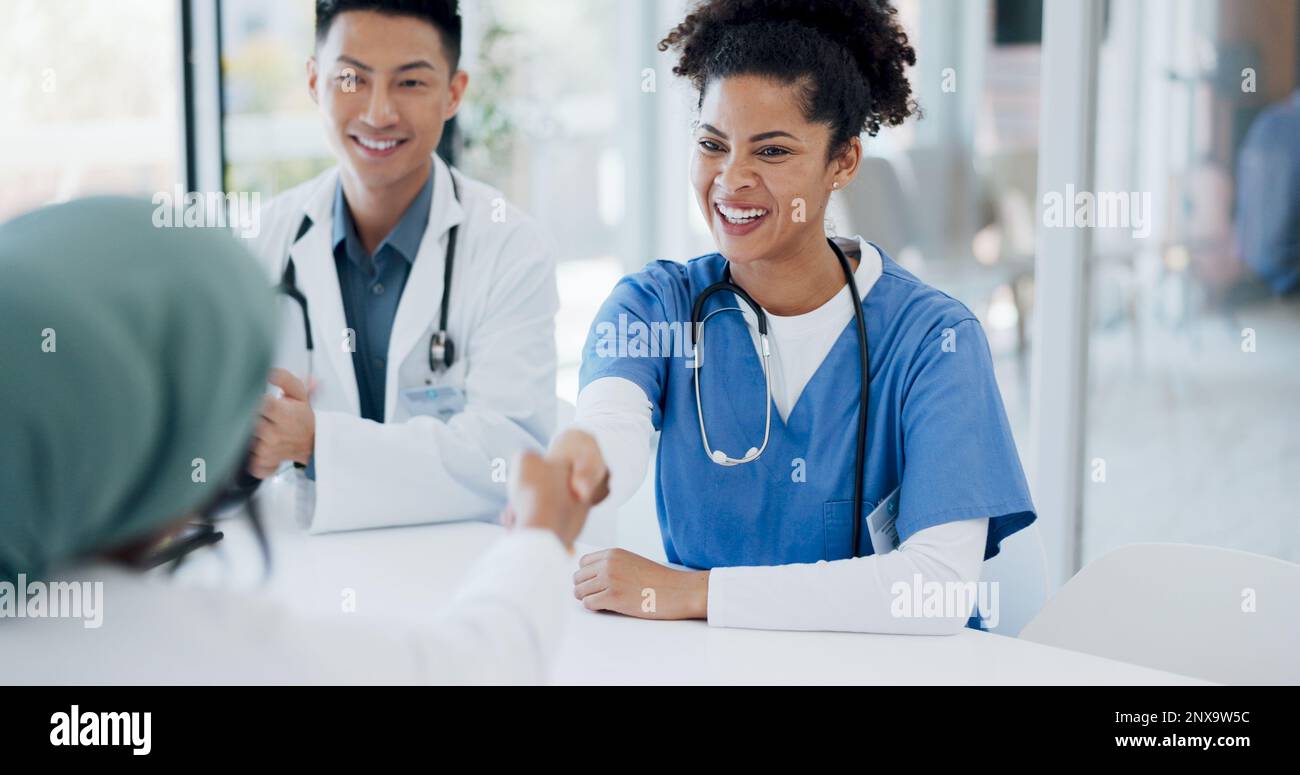 Doctors handshake, welcome and hospital team with applause, onboarding ...