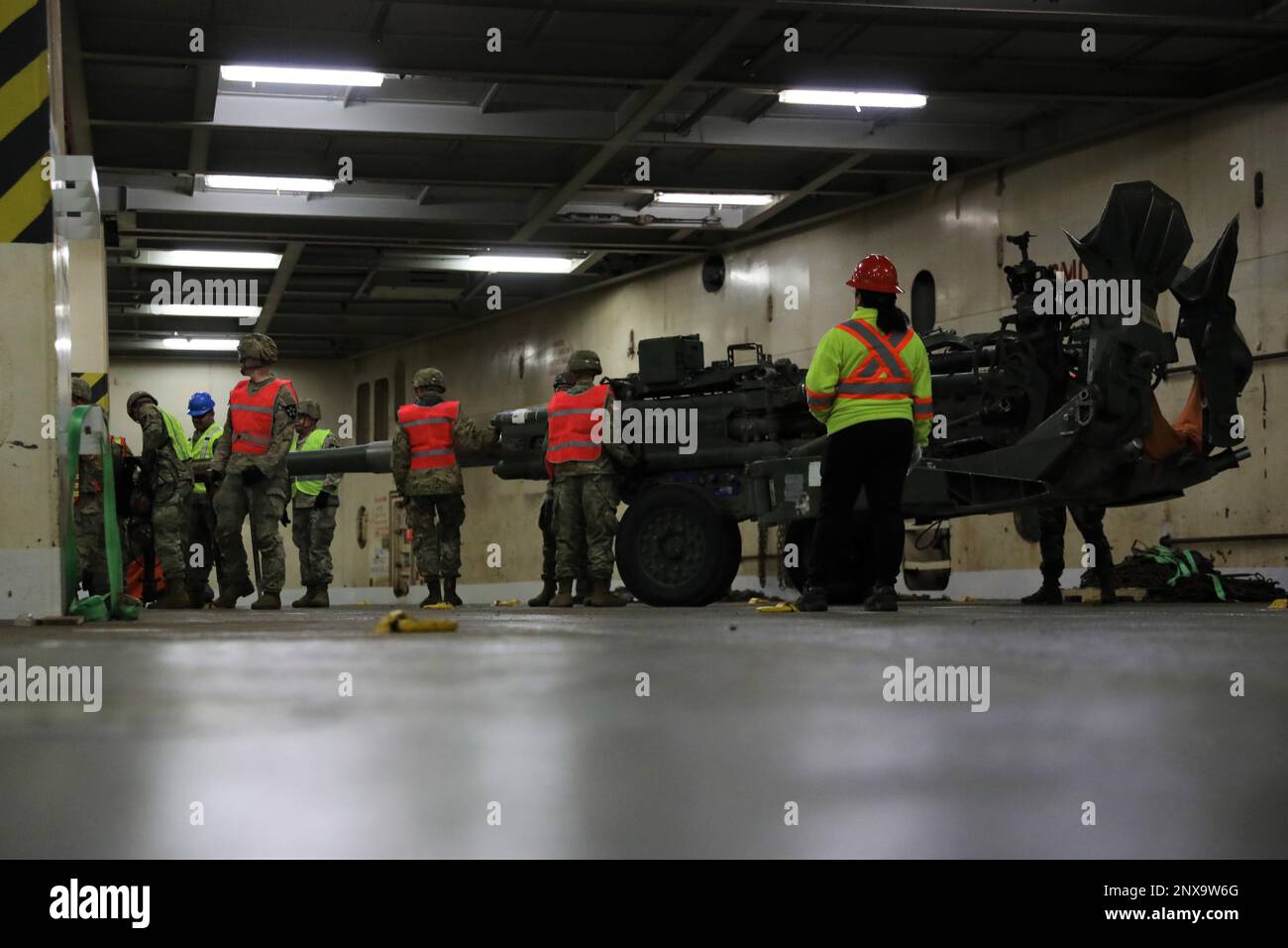 Soldiers of 1st Battalion, 37th Field Artillery Regiment position M777 ...