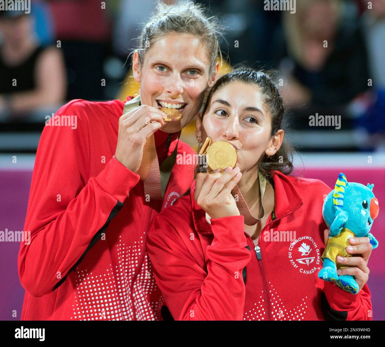 Canada's Sarah Pavan, left, and Melissa Humana-Paredes show their gold ...
