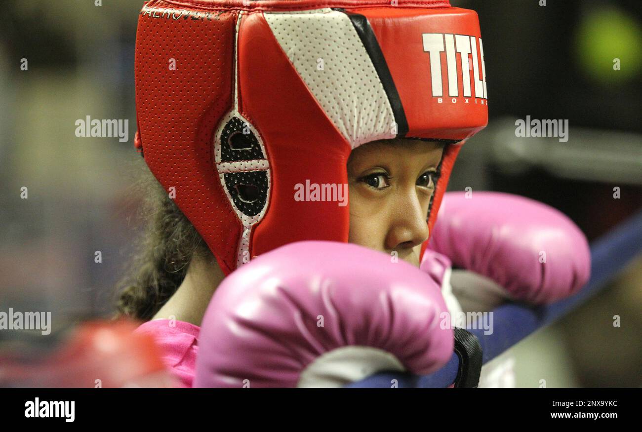 In this March 22, 2018 photo, Aniya Cordova, 10, psyches herself up for ...