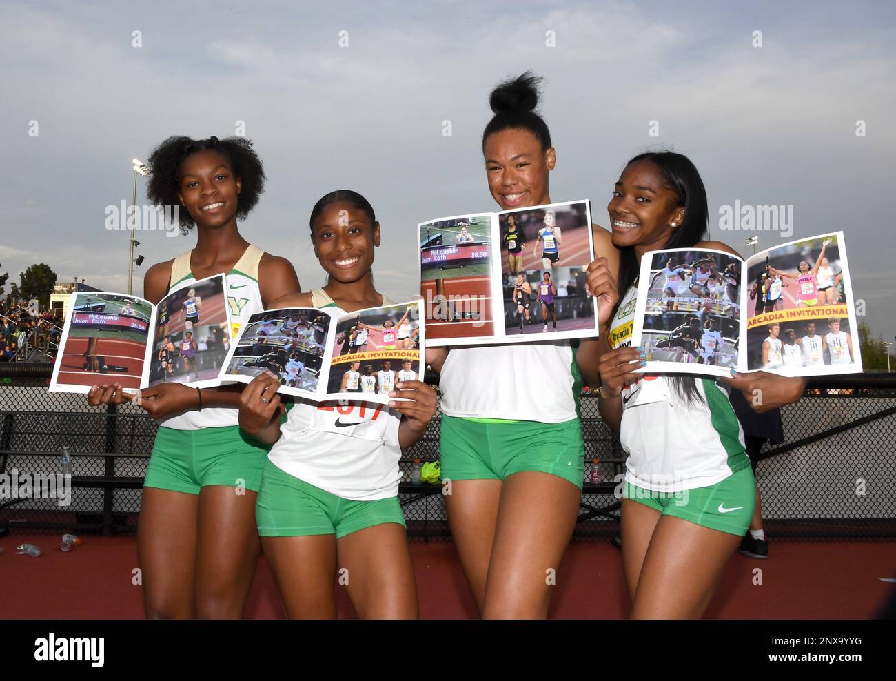 Members of the Long Beach Poly girls 800m sprint medley relay pose with ...